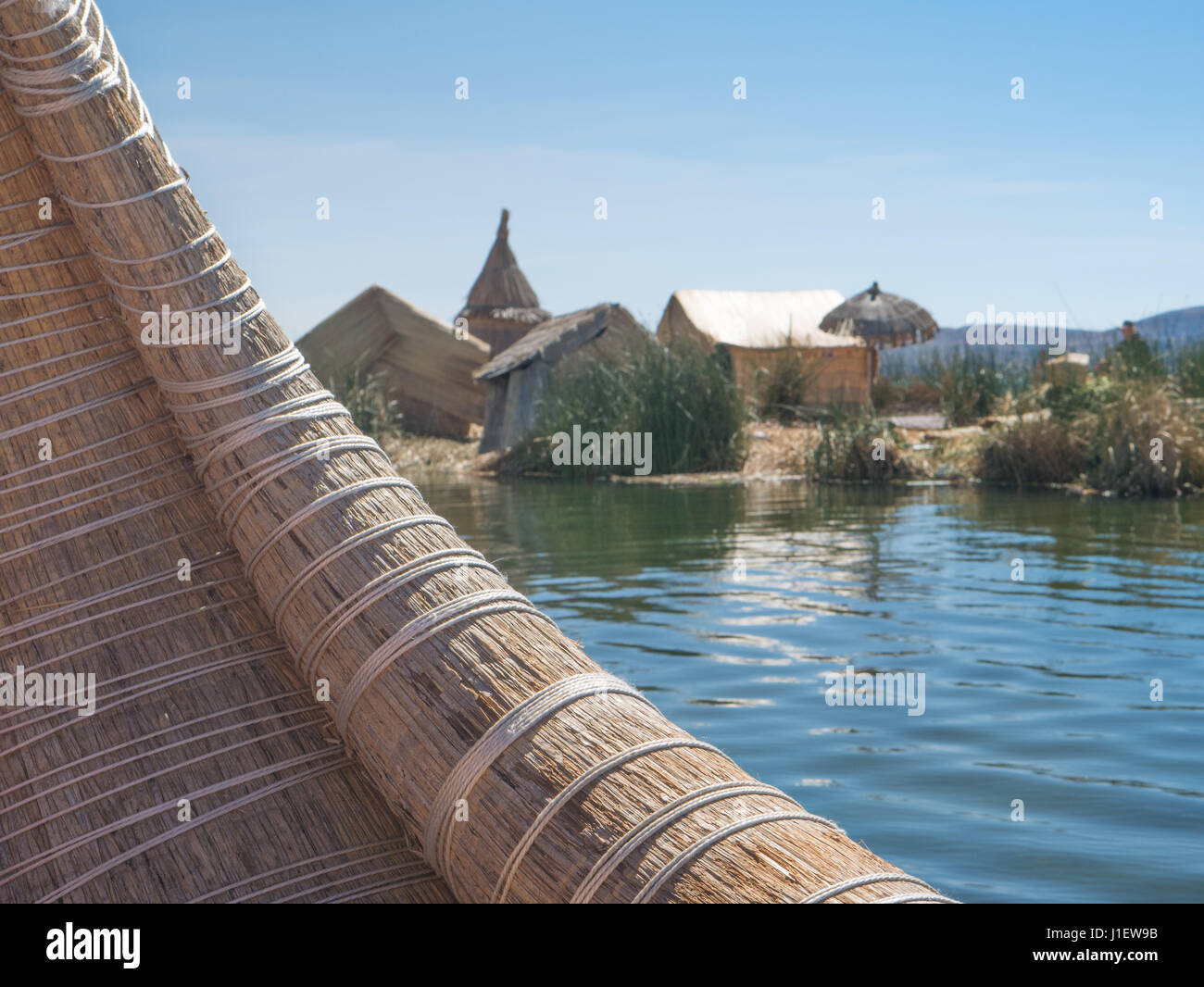 View of the Uros floating reed islands with boats, mysterious Lake ...