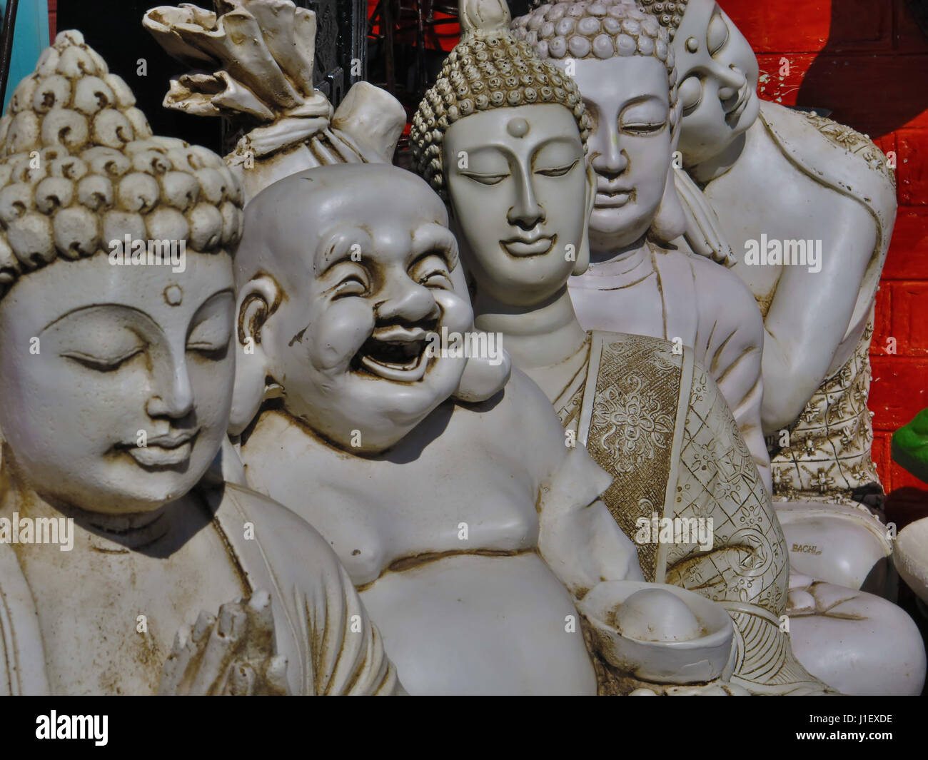 Five faces buddha statues Stock Photo - Alamy