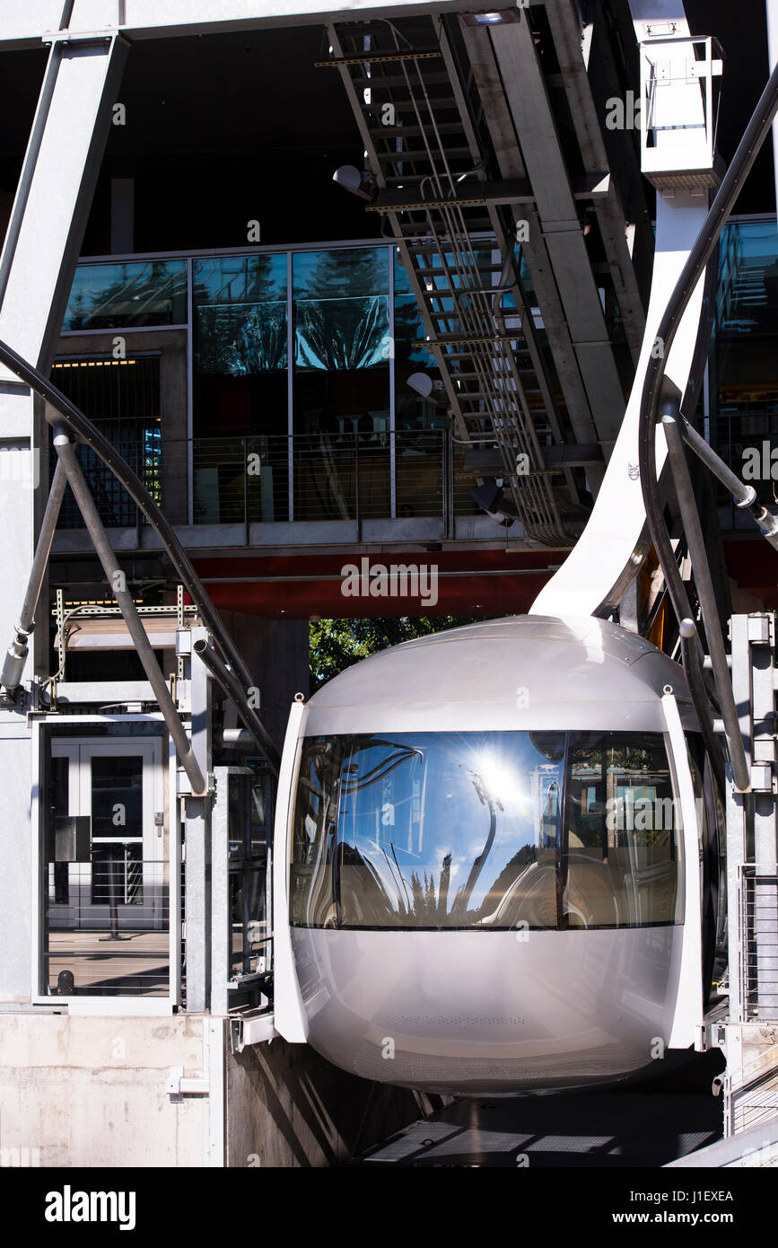 Modern bus streamlined brushed aluminum with windows of a convex mirror ...