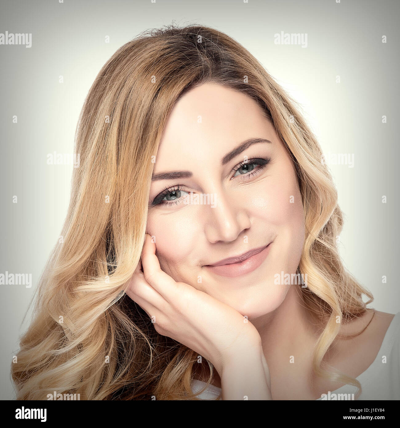 Attractive smiling woman Stock Photo - Alamy