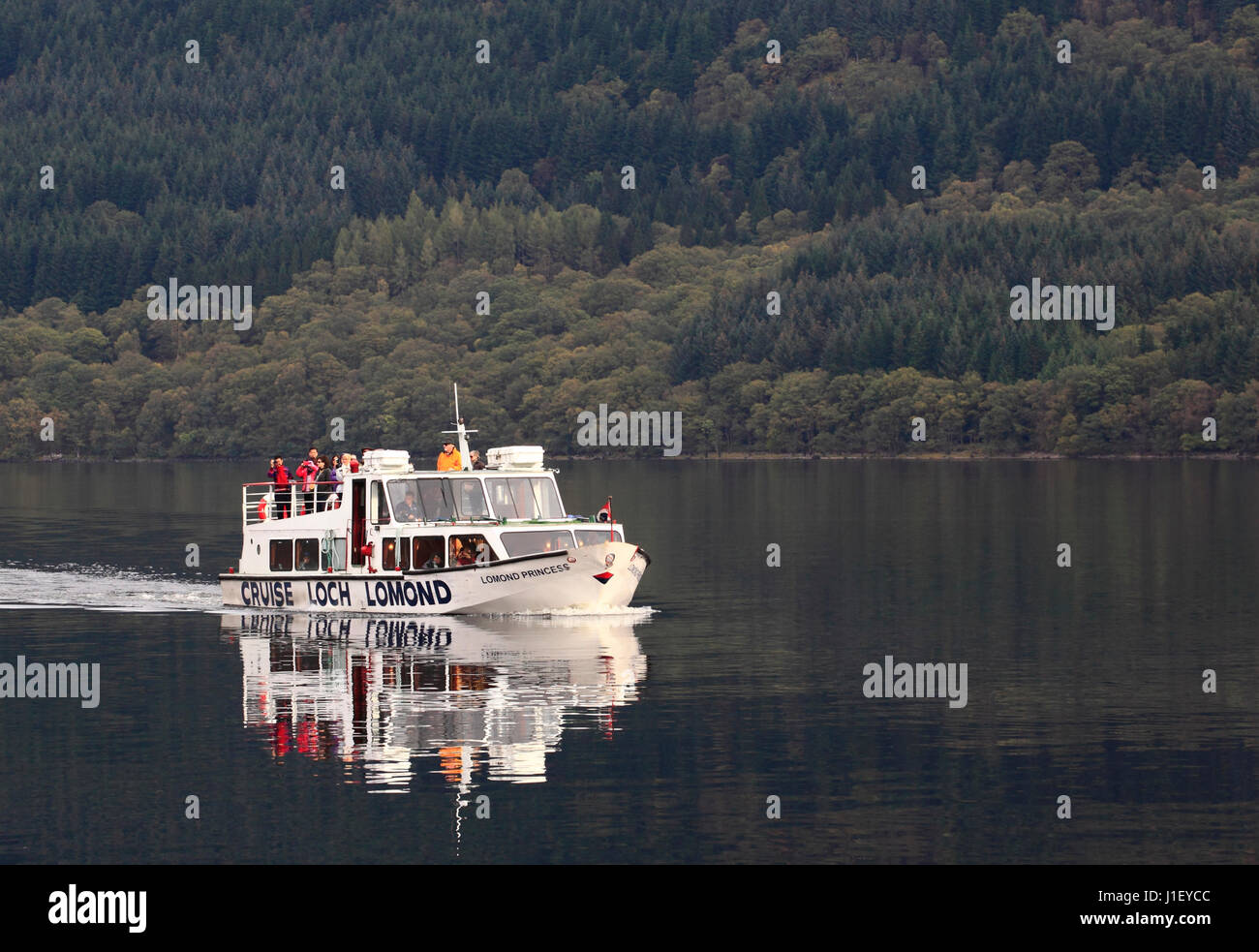 A tour cruise boat on Loch Lomond, Trossachs National Park, Scotland ...