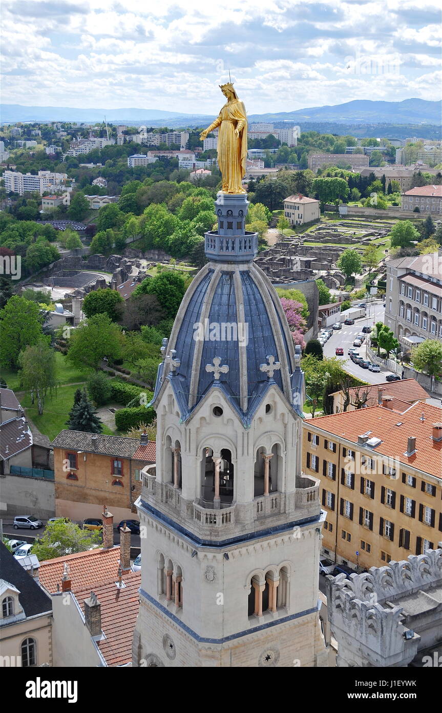 Golden statue of Virgin Mary looks upon Lyon (South-East France) from ...