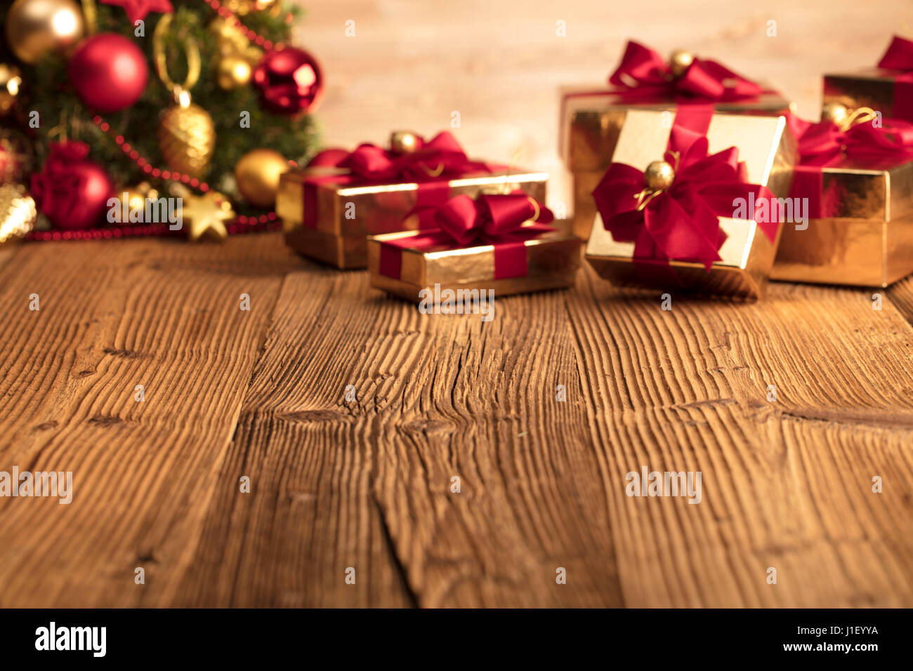 Christmas theme. Set of Christmas gifts on wooden table Stock Photo - Alamy
