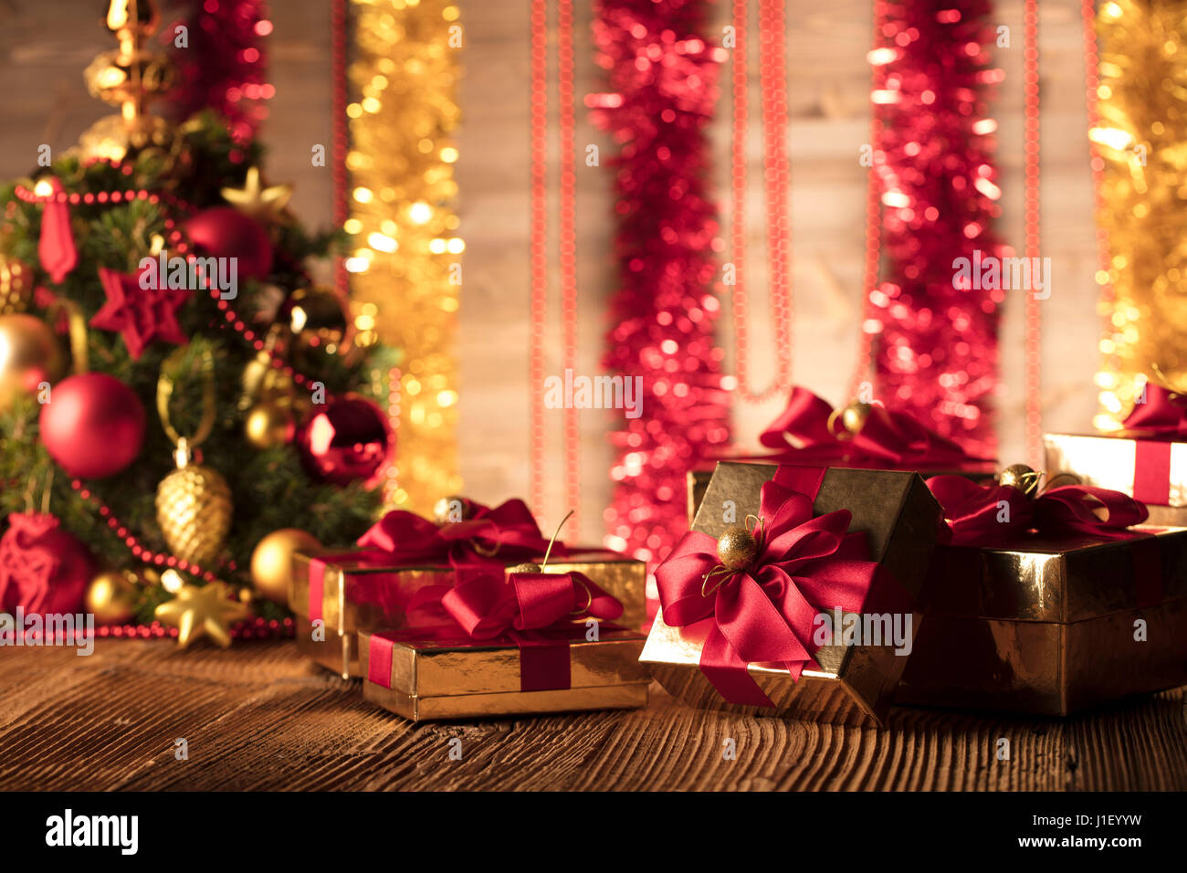 Christmas theme. Set of Christmas gifts on wooden table Stock Photo - Alamy