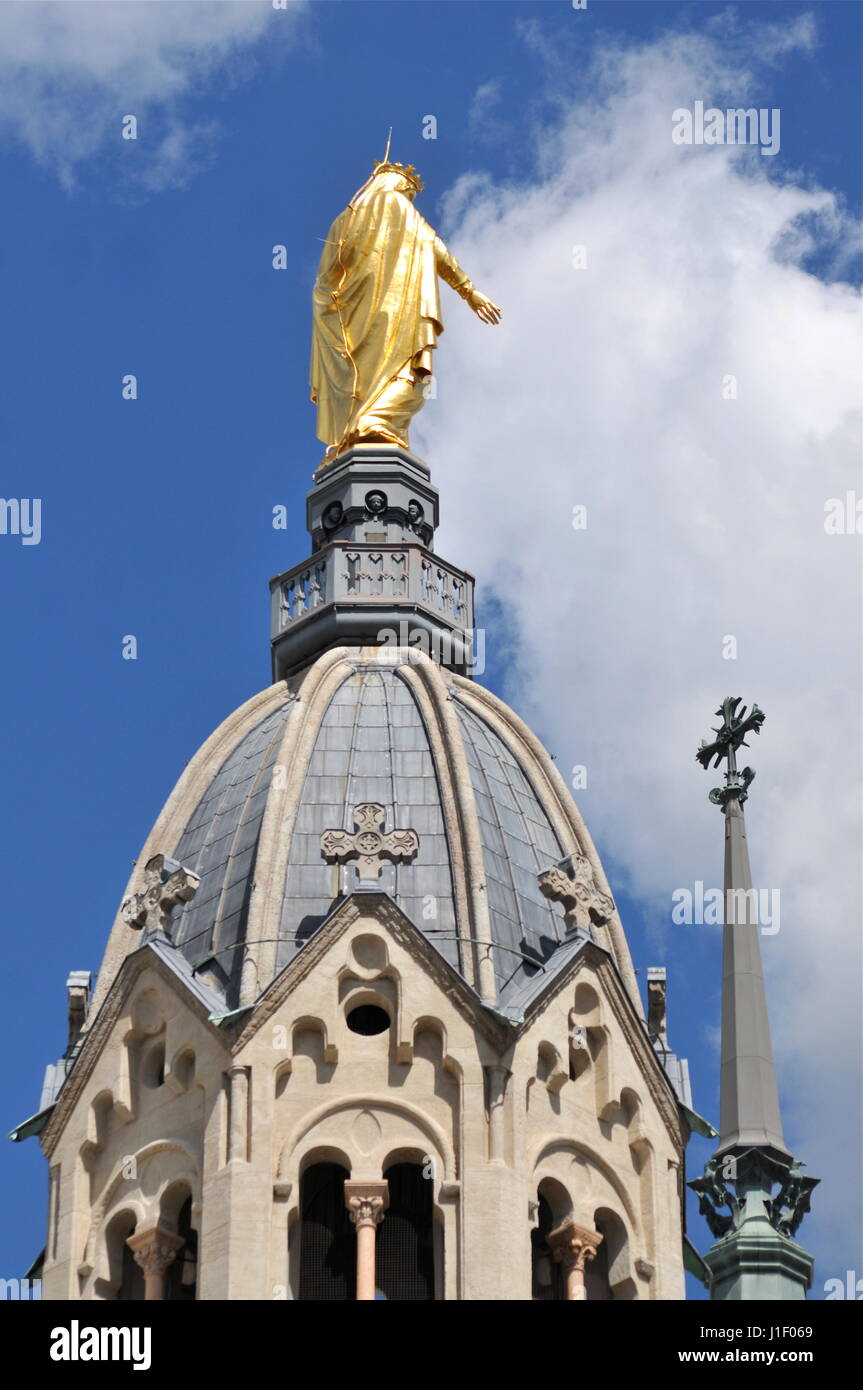 Golden statue of Virgin Mary looks upon Lyon (South-East France) from ...
