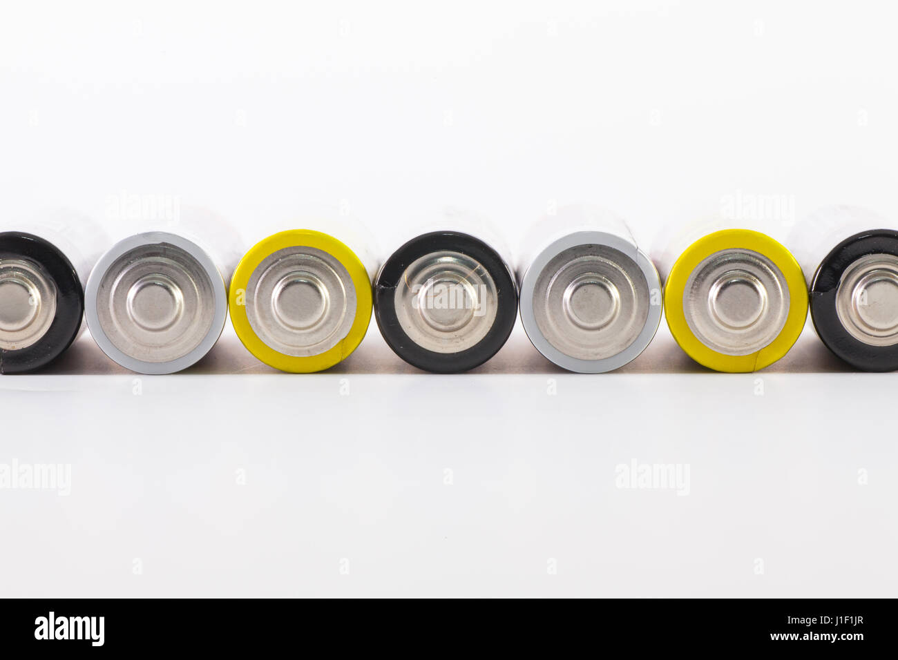 Energy abstract background of different batteries. AA size alkaline ...
