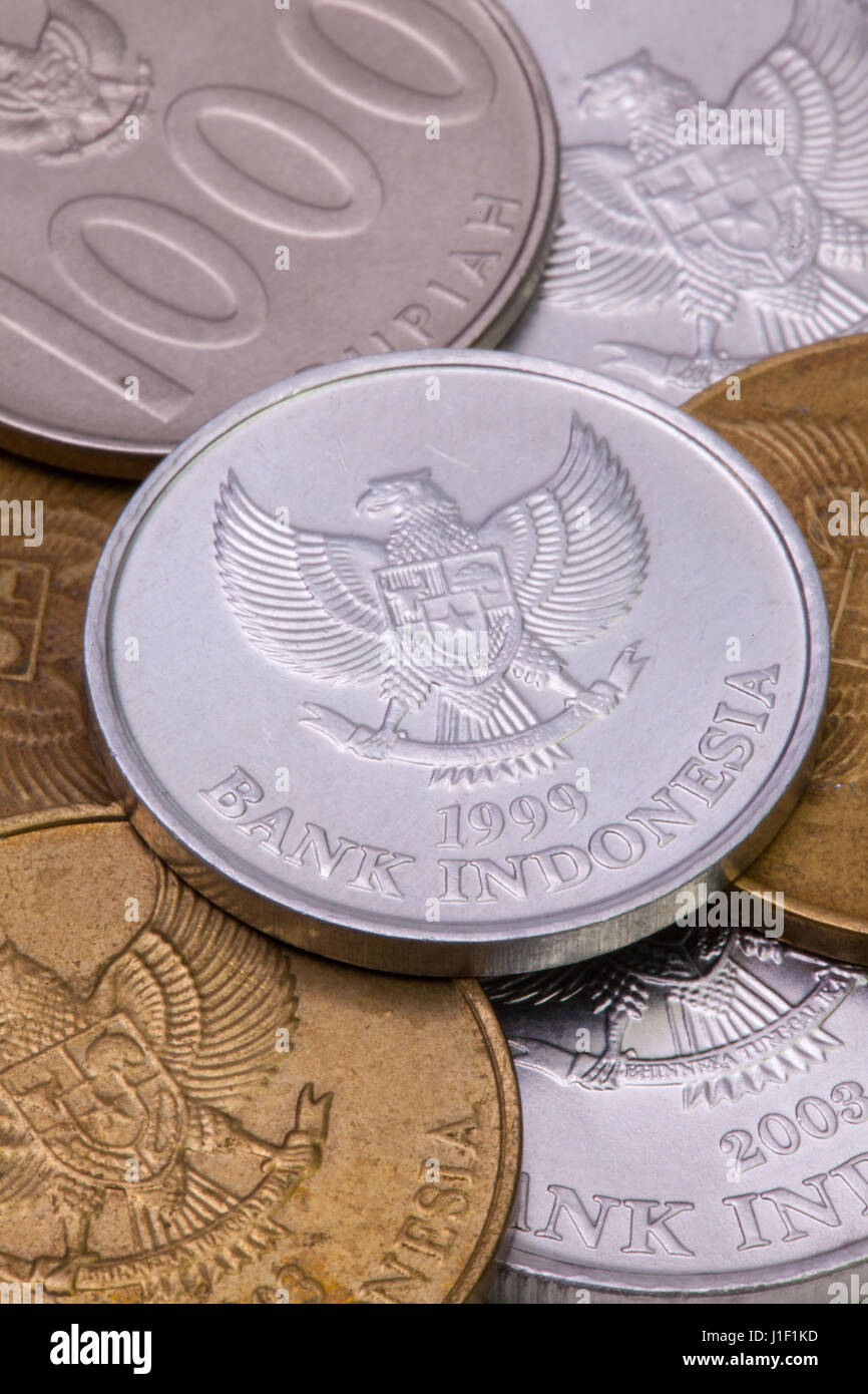 Detail of different Indonesian rupiah coins on the table Stock Photo ...