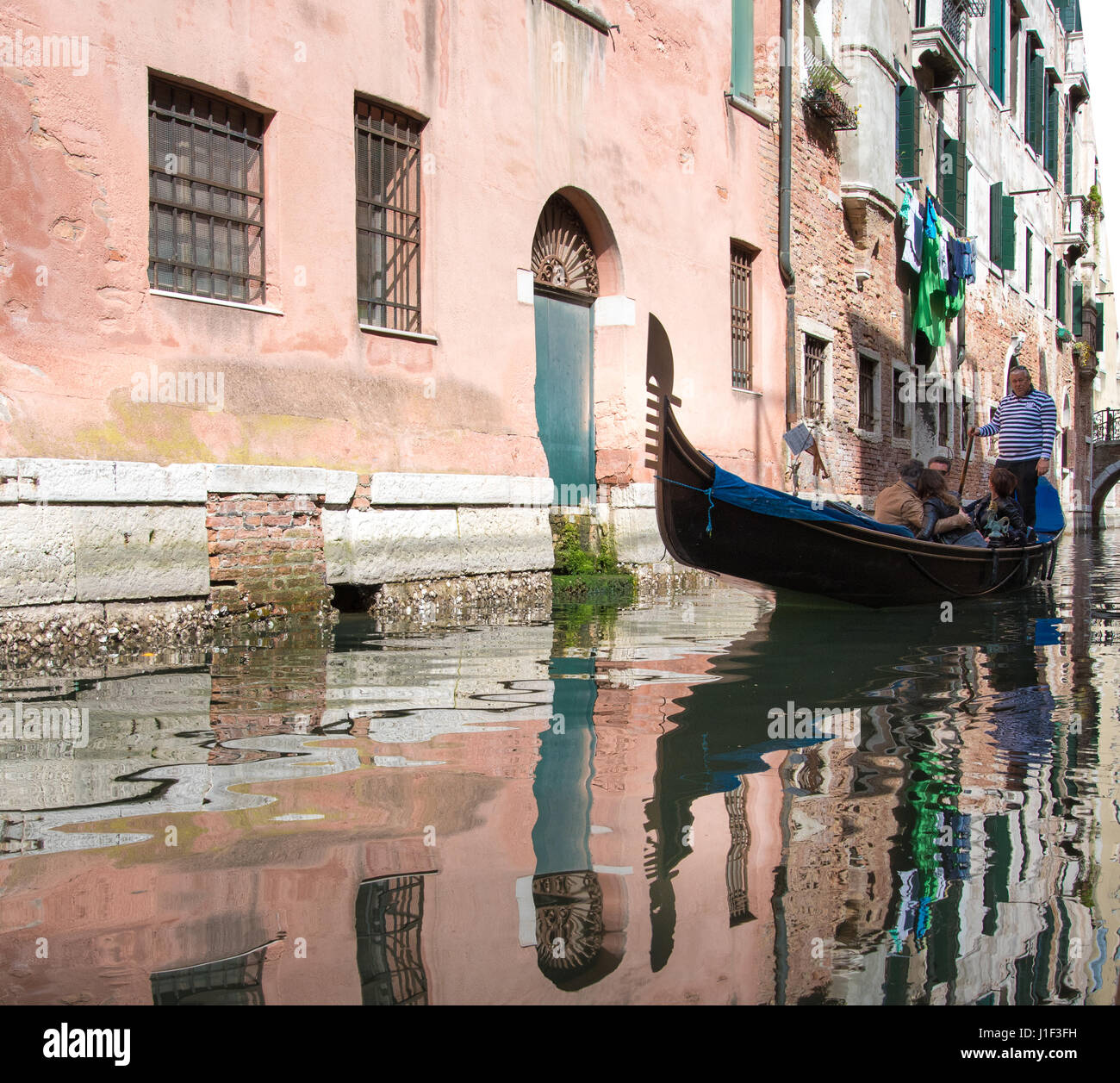 Rowing his gondola hi-res stock photography and images - Alamy