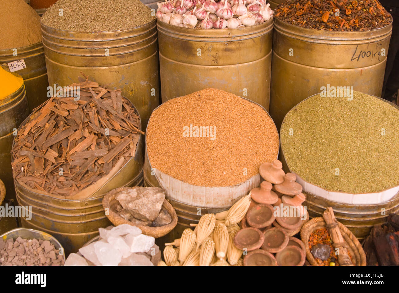 Containers of spices and food ingredients for sale in a shop in the ...