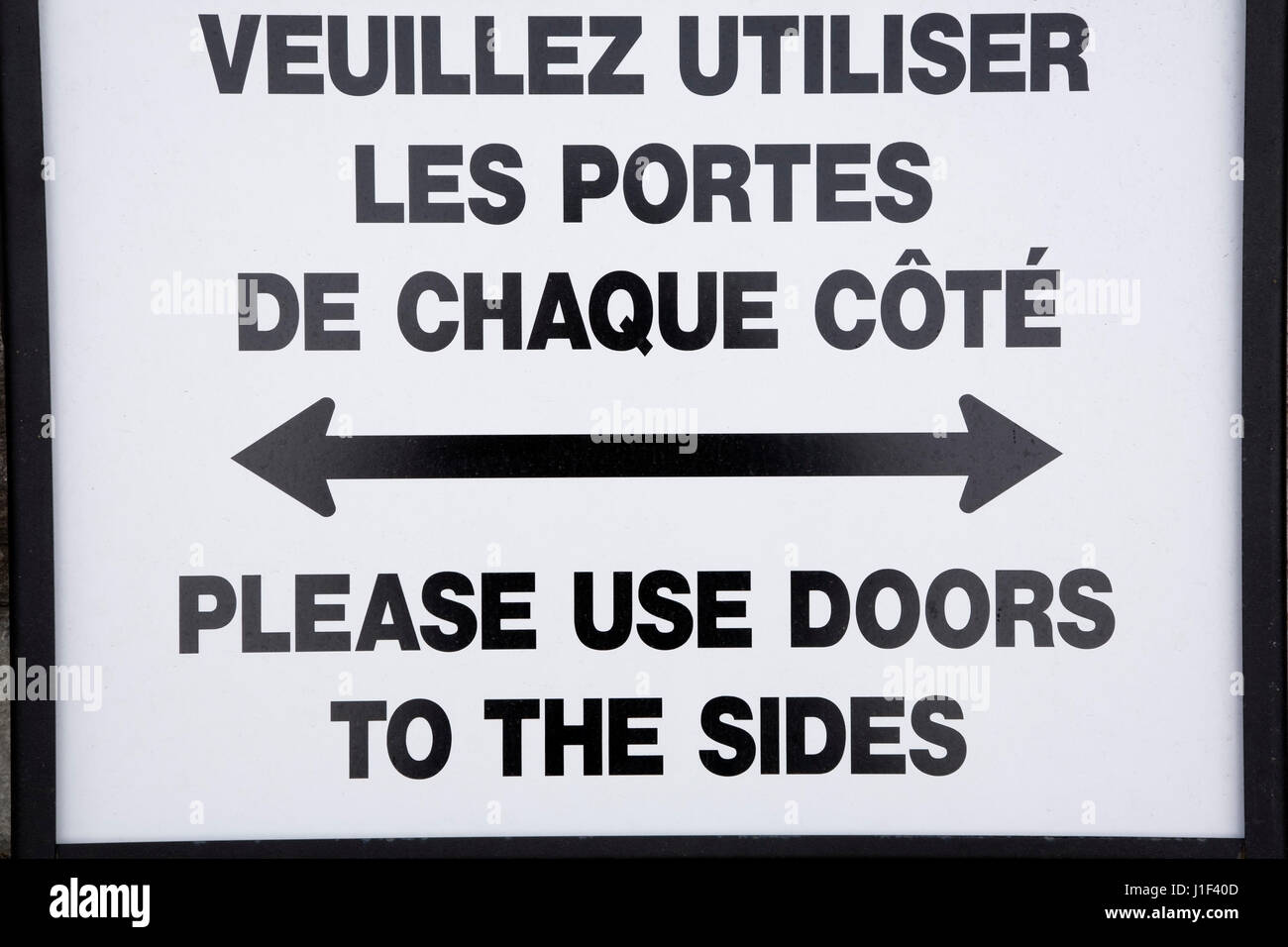 Direction sign indicating doors to use for pedestrian traffic Stock ...