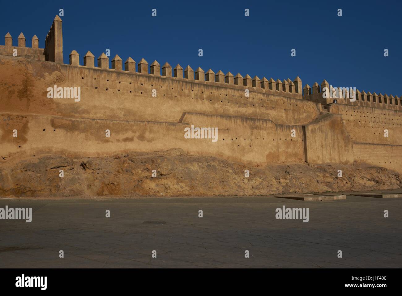 Fortified walls surrounding the ancient city of Fes in Morocco, North ...