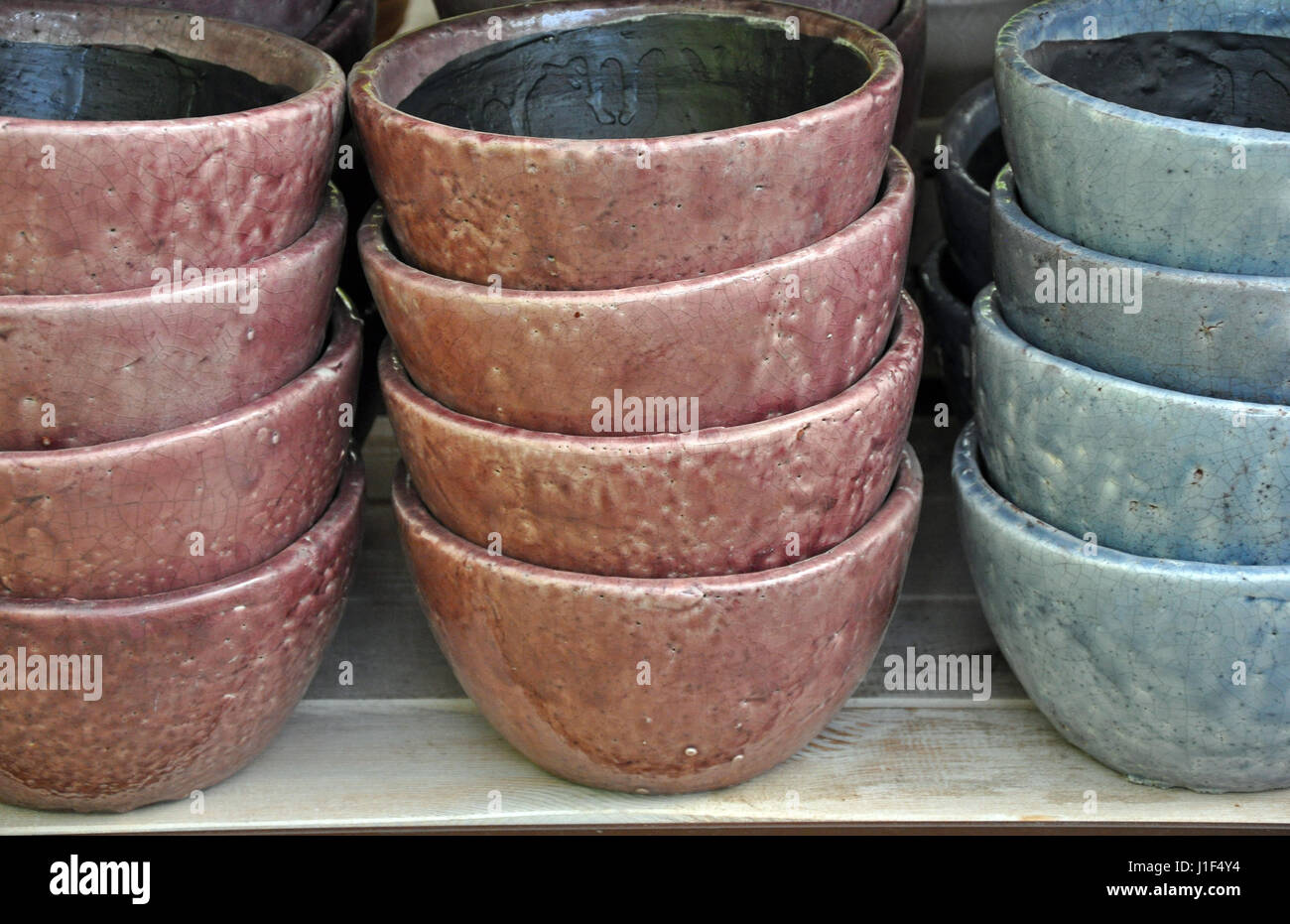 Colorful glazed ceramic pottery Stock Photo - Alamy
