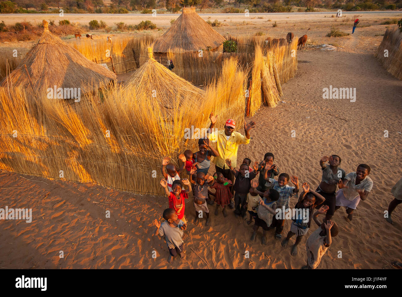 African family living at Caprivi Strip in typical grass huts as seen in ...