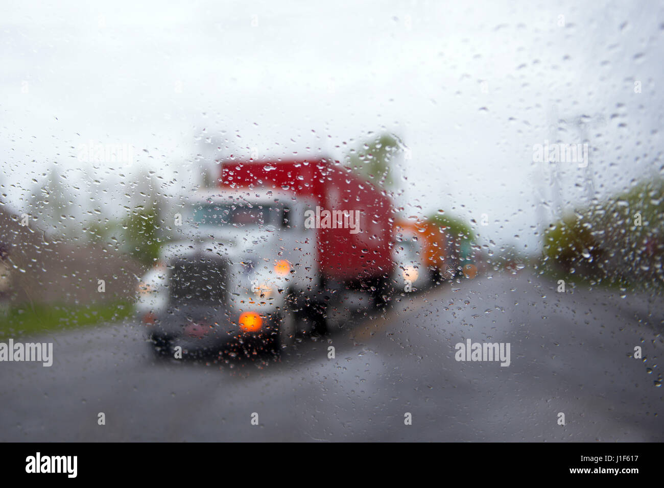 The convoy loaded big rig semi trucks with trailers and containers on ...
