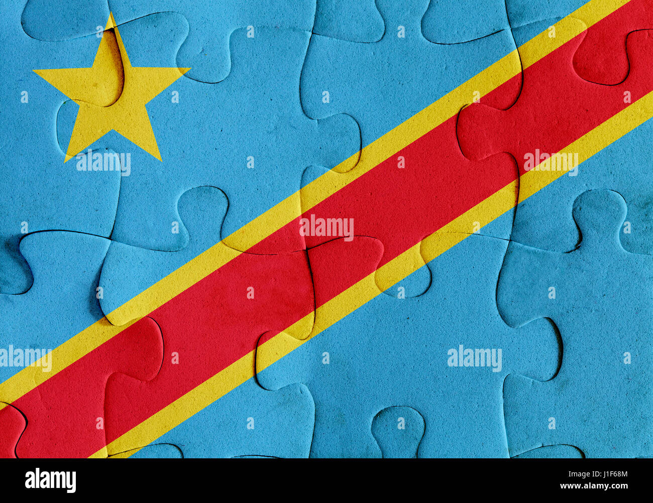 Illustration of a flag of Democratic Republic of Congo over some puzzle ...