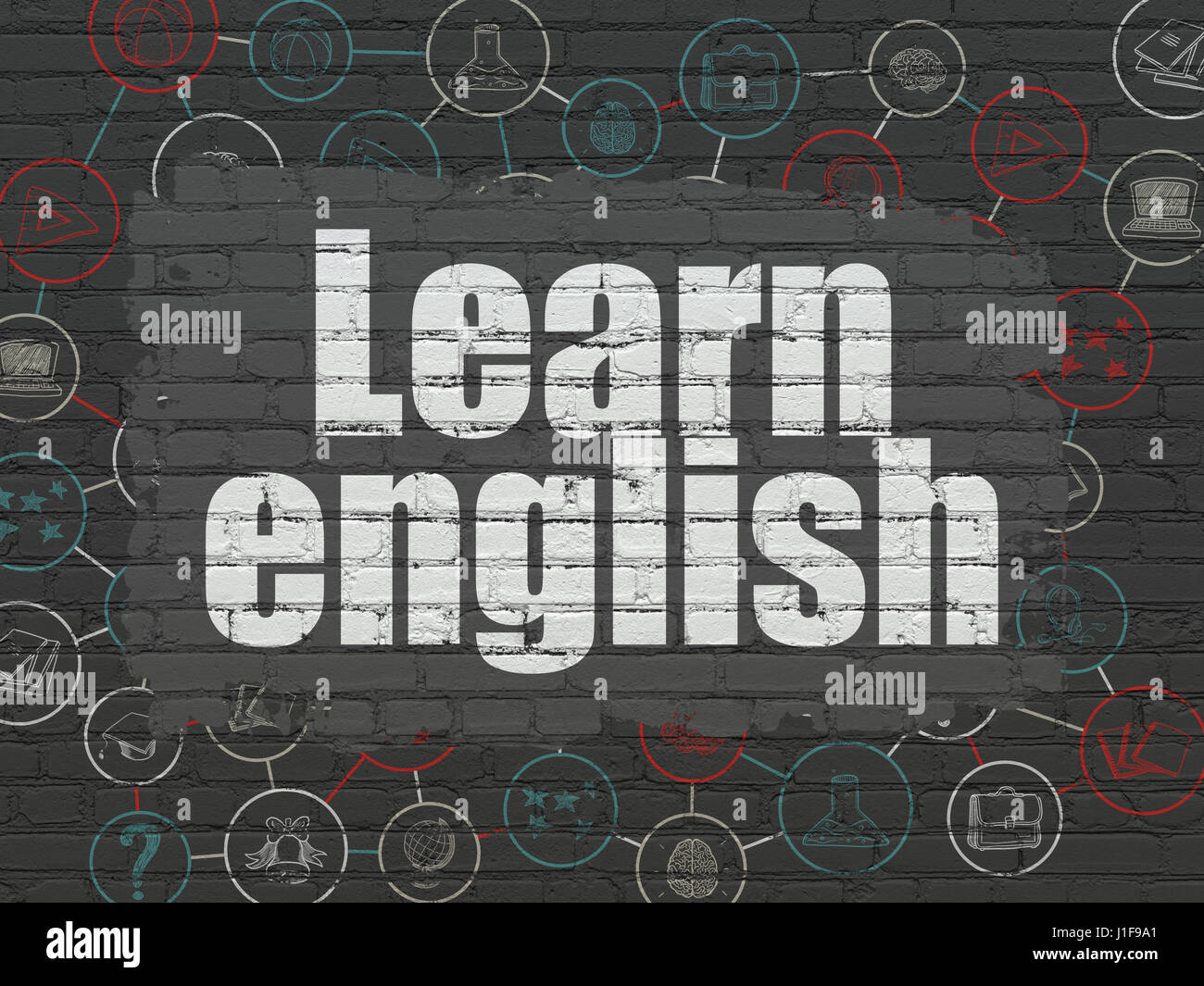 Studying concept: Learn English on wall background Stock Photo - Alamy