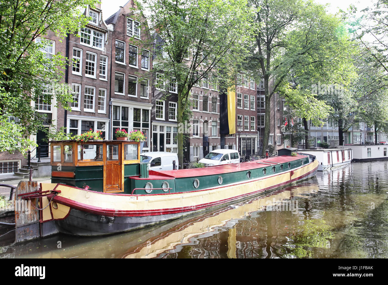 View of Amsterdam canal with boats, Netherlands Stock Photo - Alamy