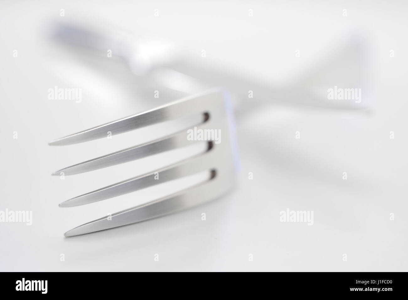 Close-up of a fork with very limited depth of field Stock Photo - Alamy