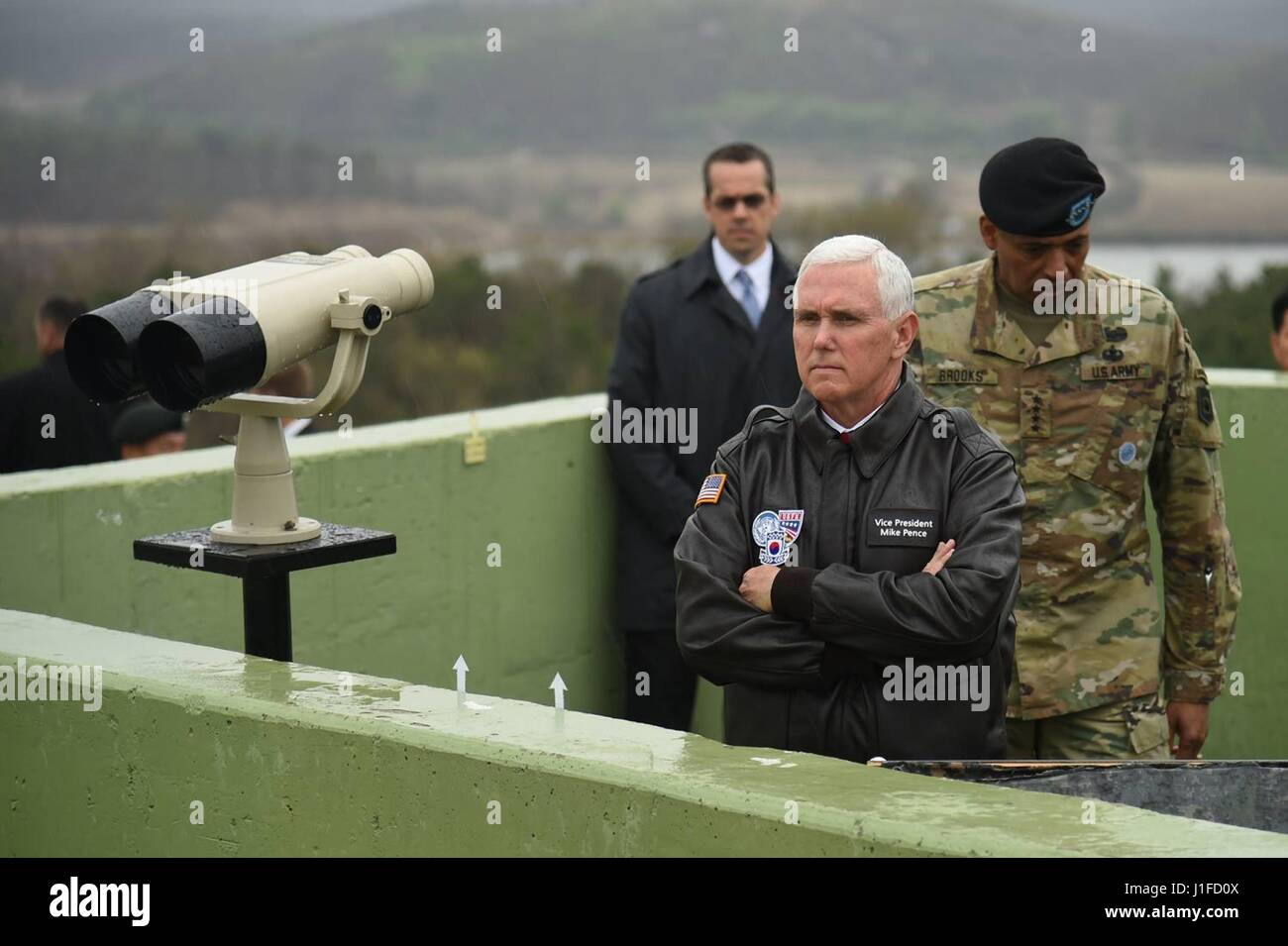 U.S. Vice President Mike Pence, looks out at the Demilitarized Zone ...