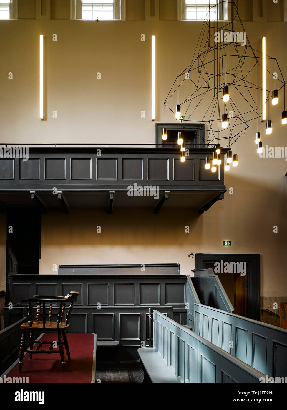 Interior view of courtroom showing benches and chandelier. Kilmainham ...
