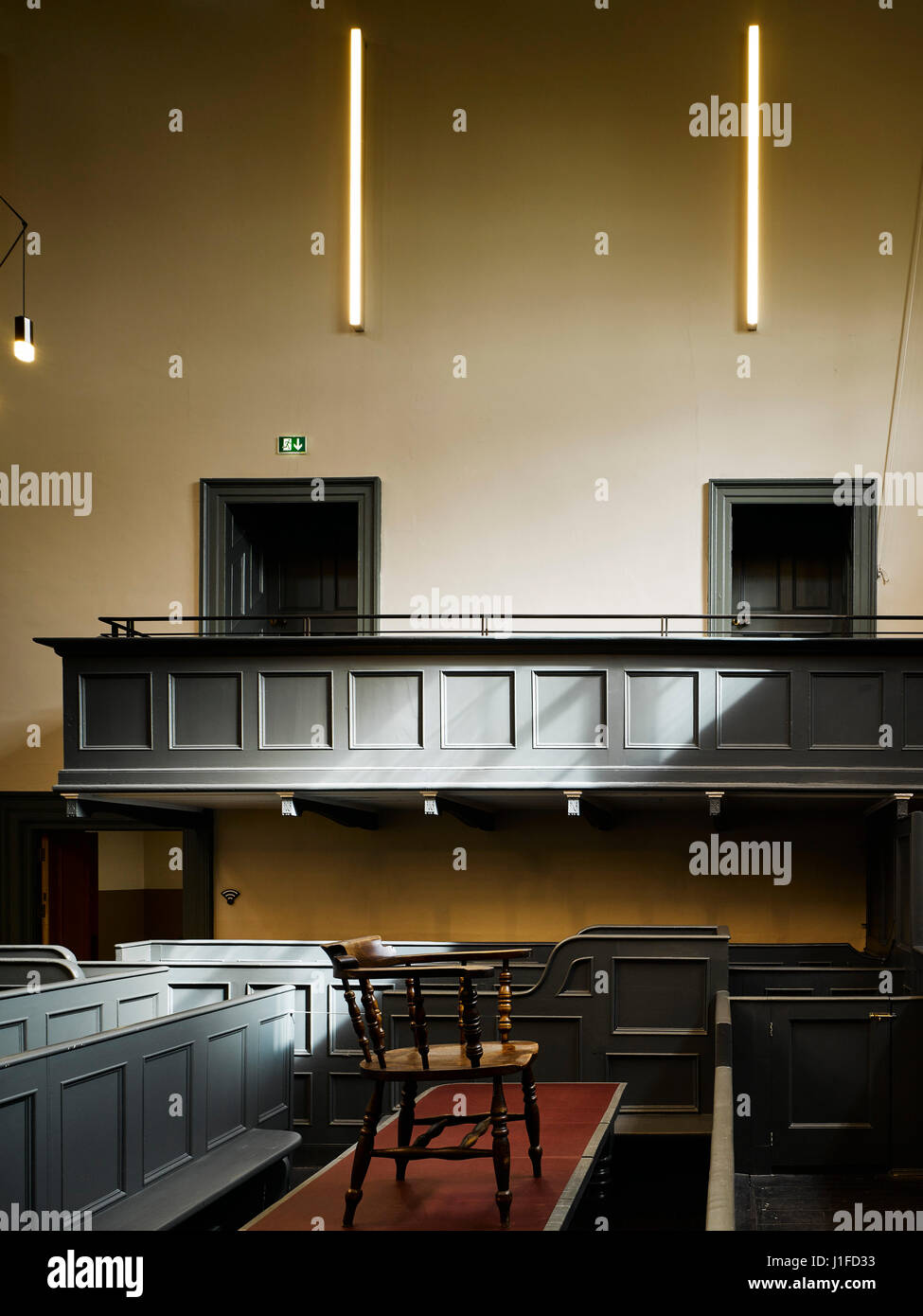 Interior view of courtroom showing benches and lighting. Kilmainham ...