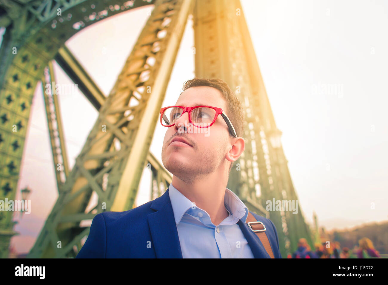 Young man thinking big Stock Photo - Alamy