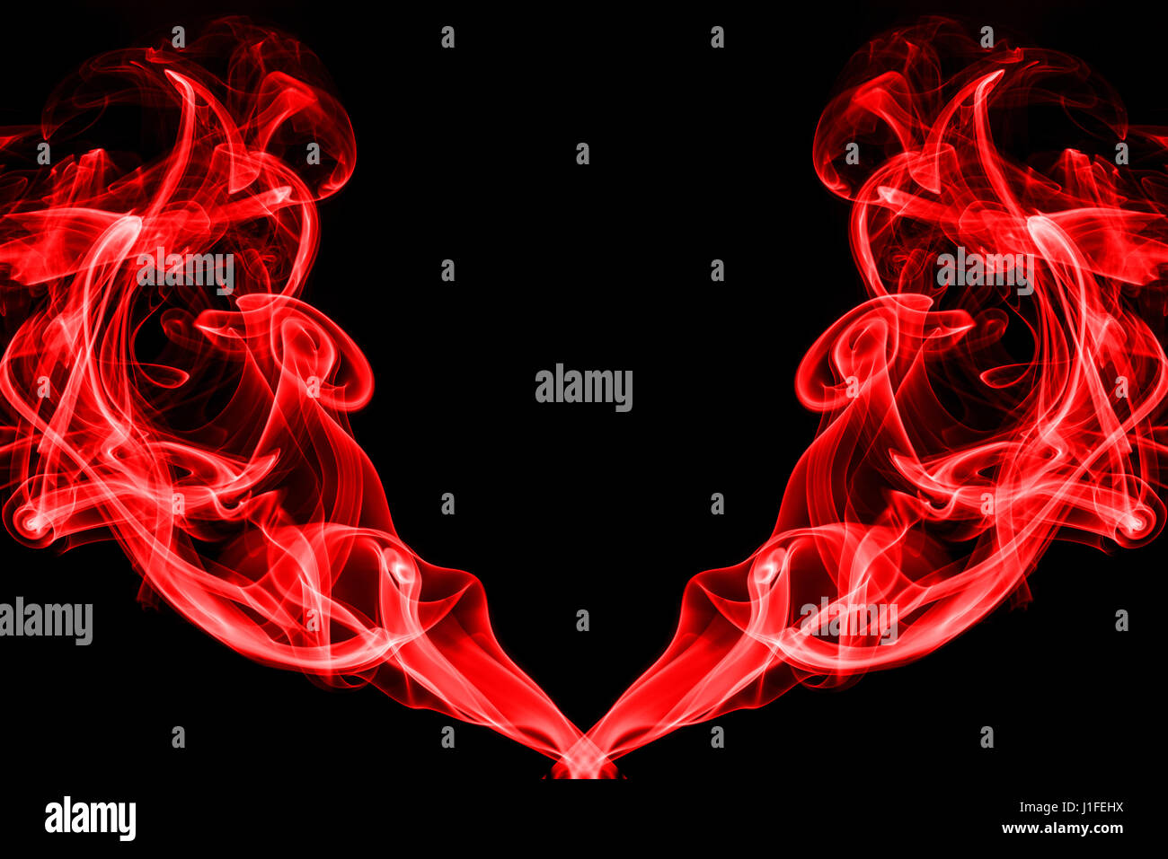 abstract frame from movement of red smoke on black background for ...