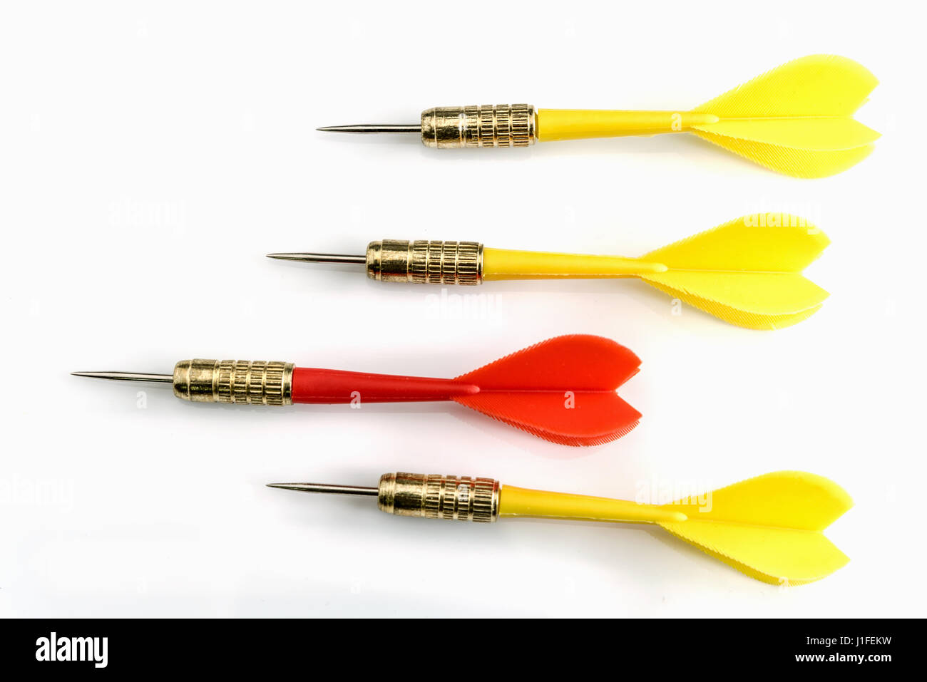 Red dart target leadership of three yellow dart target over white ...