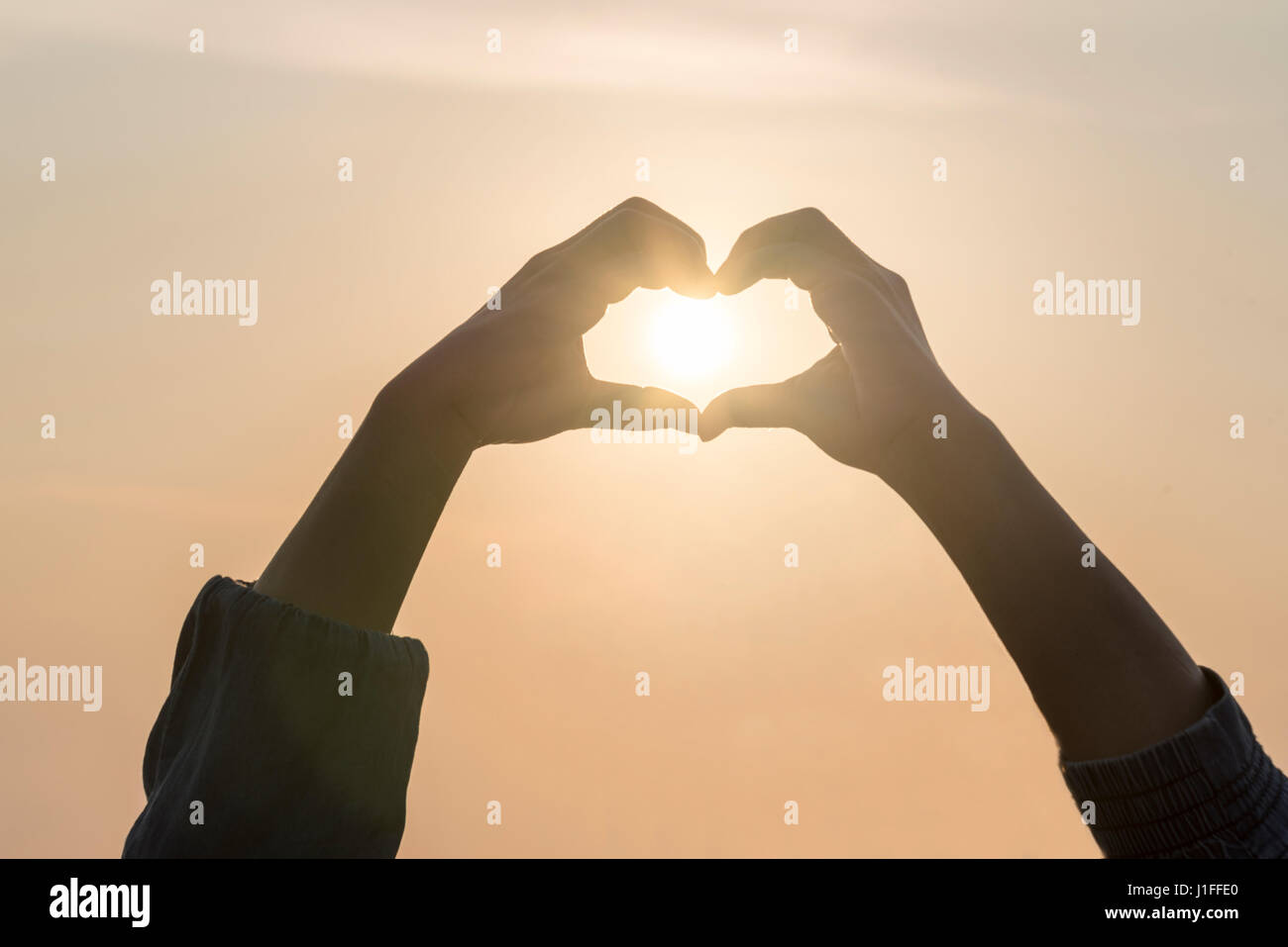 Hands forming a heart shape hi-res stock photography and images - Alamy