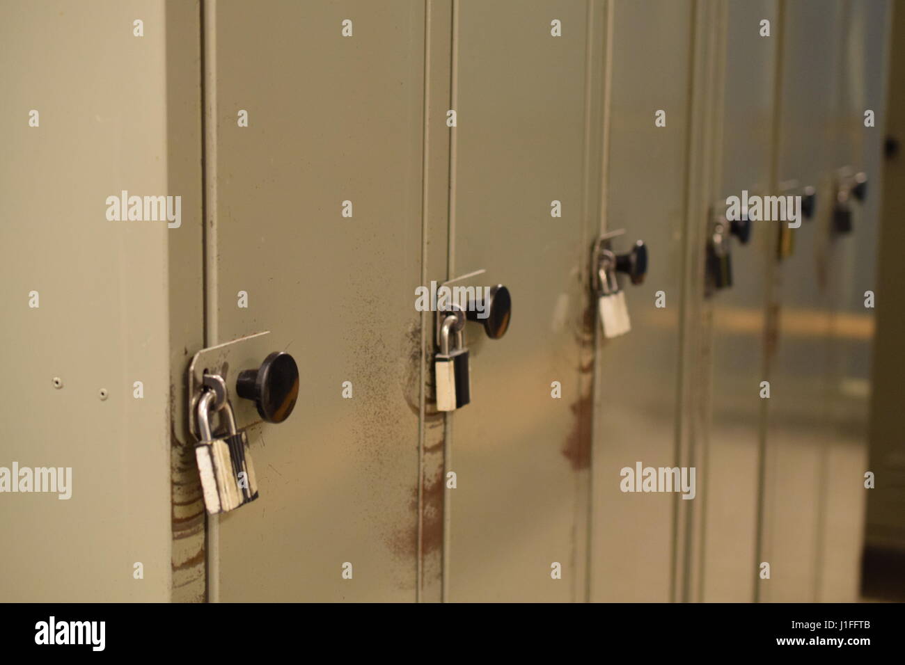 Beige lockers in locker room Stock Photo - Alamy