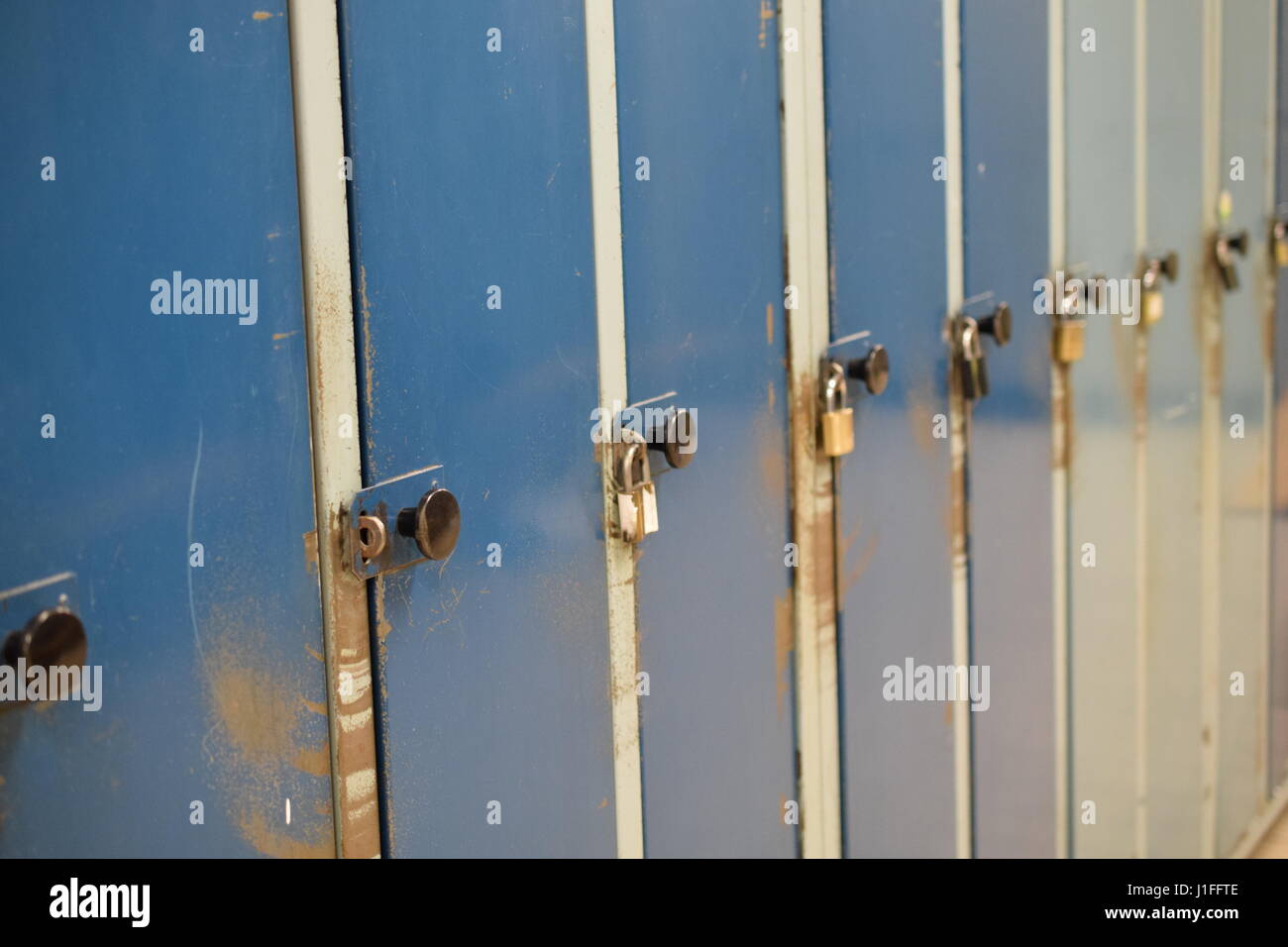 Blue and grey old lockers in locker room Stock Photo - Alamy