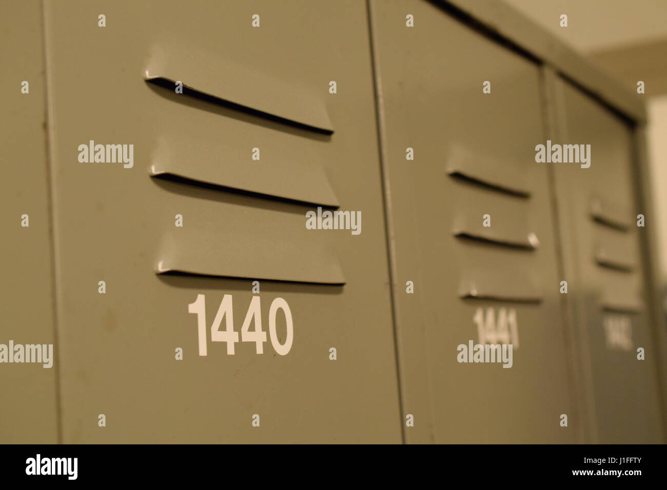 Beige lockers in locker room Stock Photo - Alamy