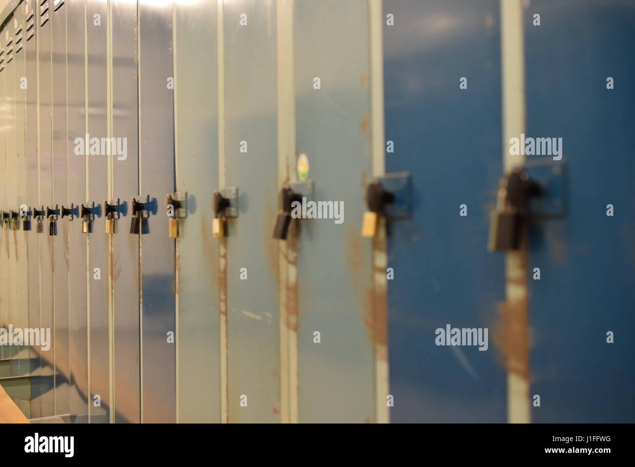 Blue and grey old lockers in locker room Stock Photo - Alamy