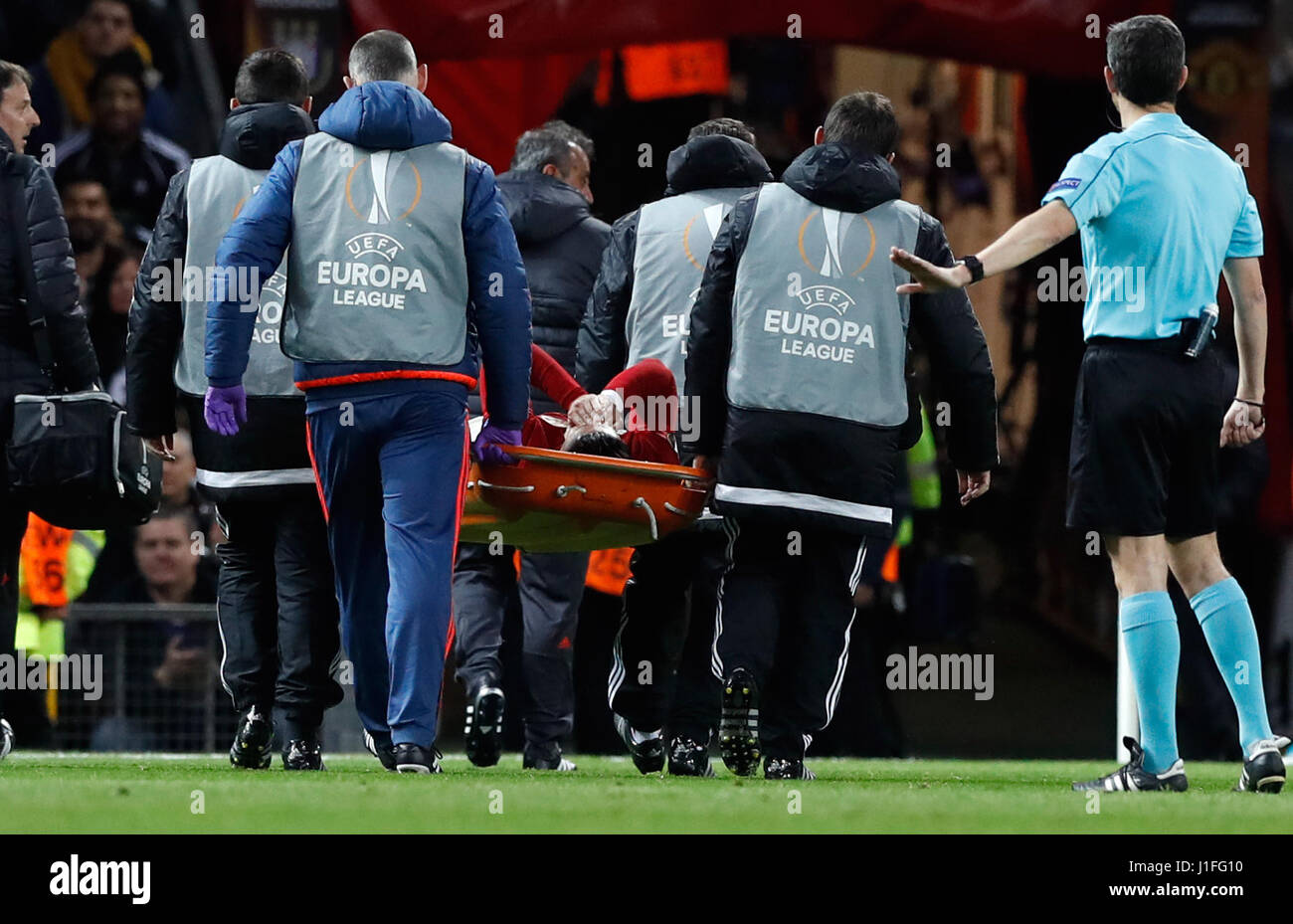 Manchester United's Marcos Rojo is stretchered off during the UEFA ...