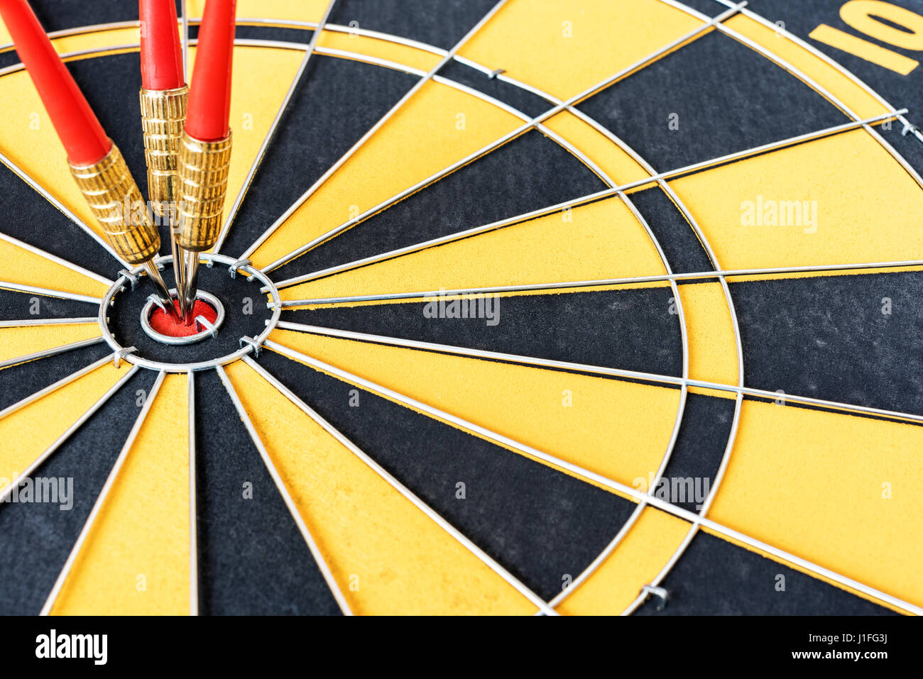 One target with three arrows hitting the bullseye (center)(goal ...