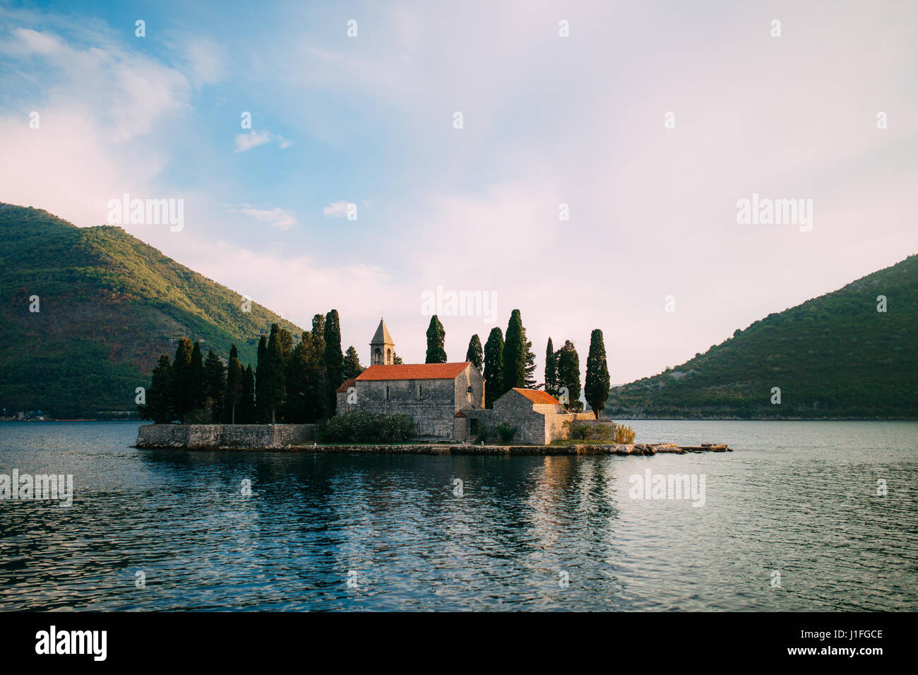 The island of Gospa od Skrpela in the Boko-Kotorsky Gulf Stock Photo ...