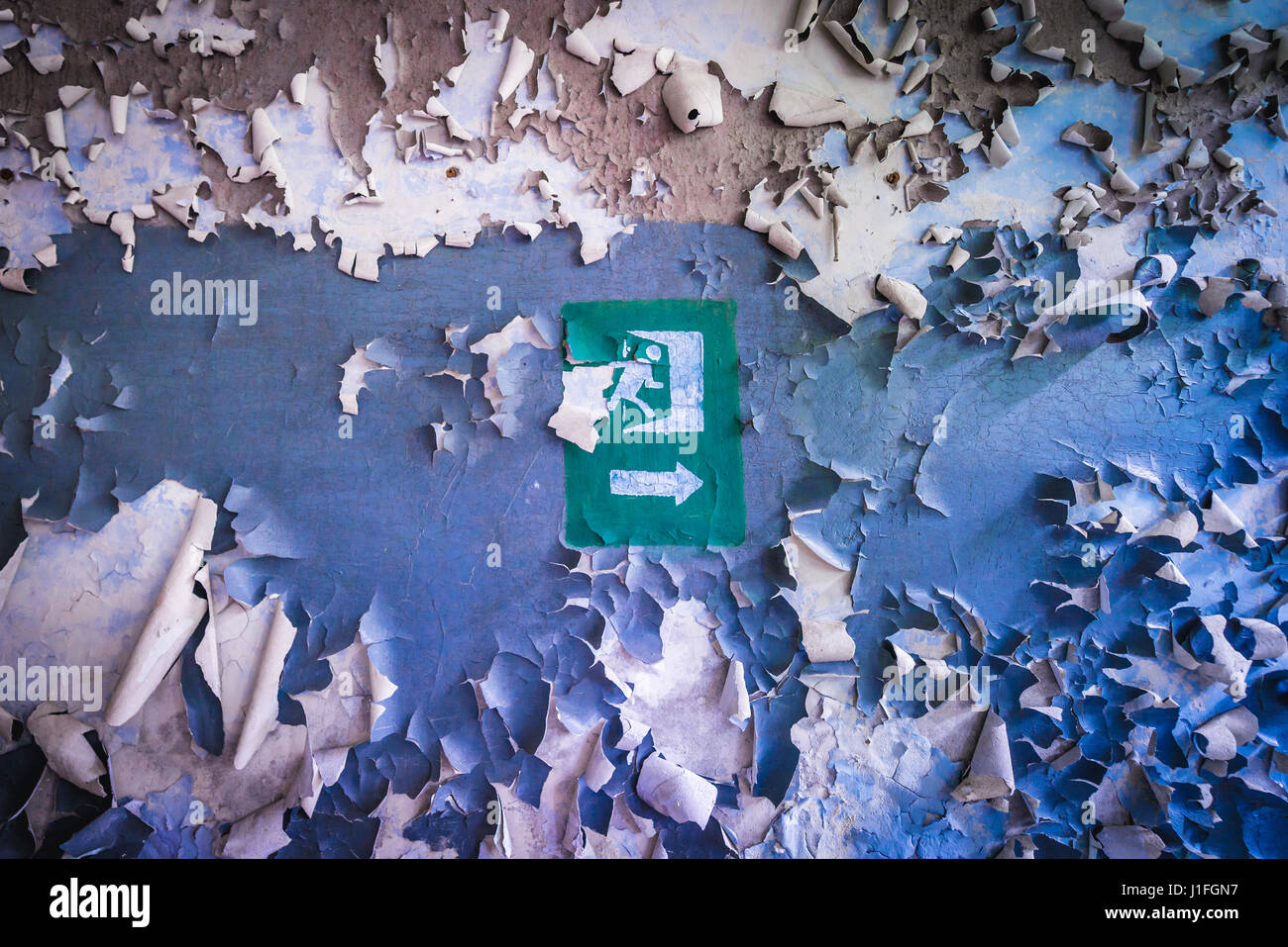 Emergency exit sign in building of Chernobyl-2 military base, Chernobyl ...
