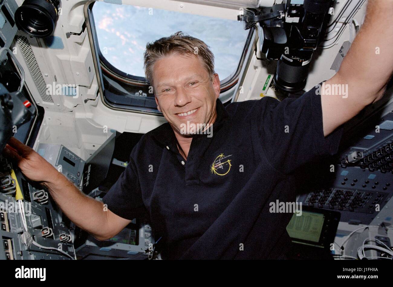 NASA International Space Station STS-112 mission prime crew astronaut Piers Sellers floats near ...