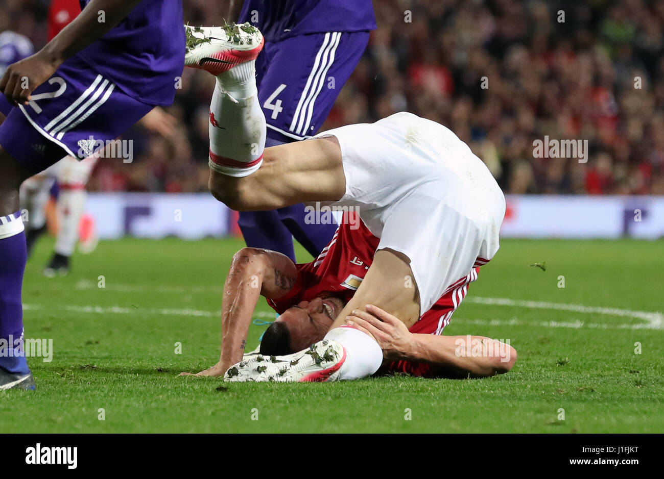 Manchester United's Zlatan Ibrahimovic falls before suffering an injury ...