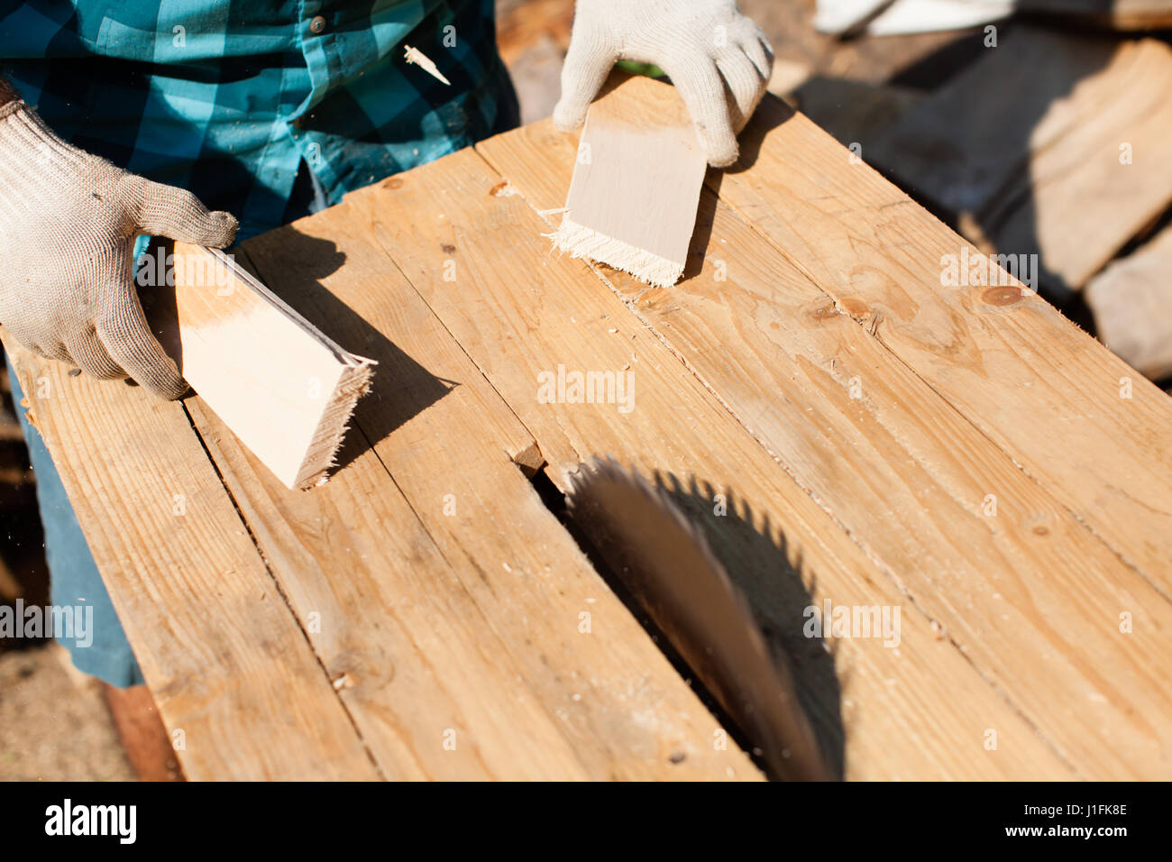 Hard work on the sawmill Stock Photo - Alamy