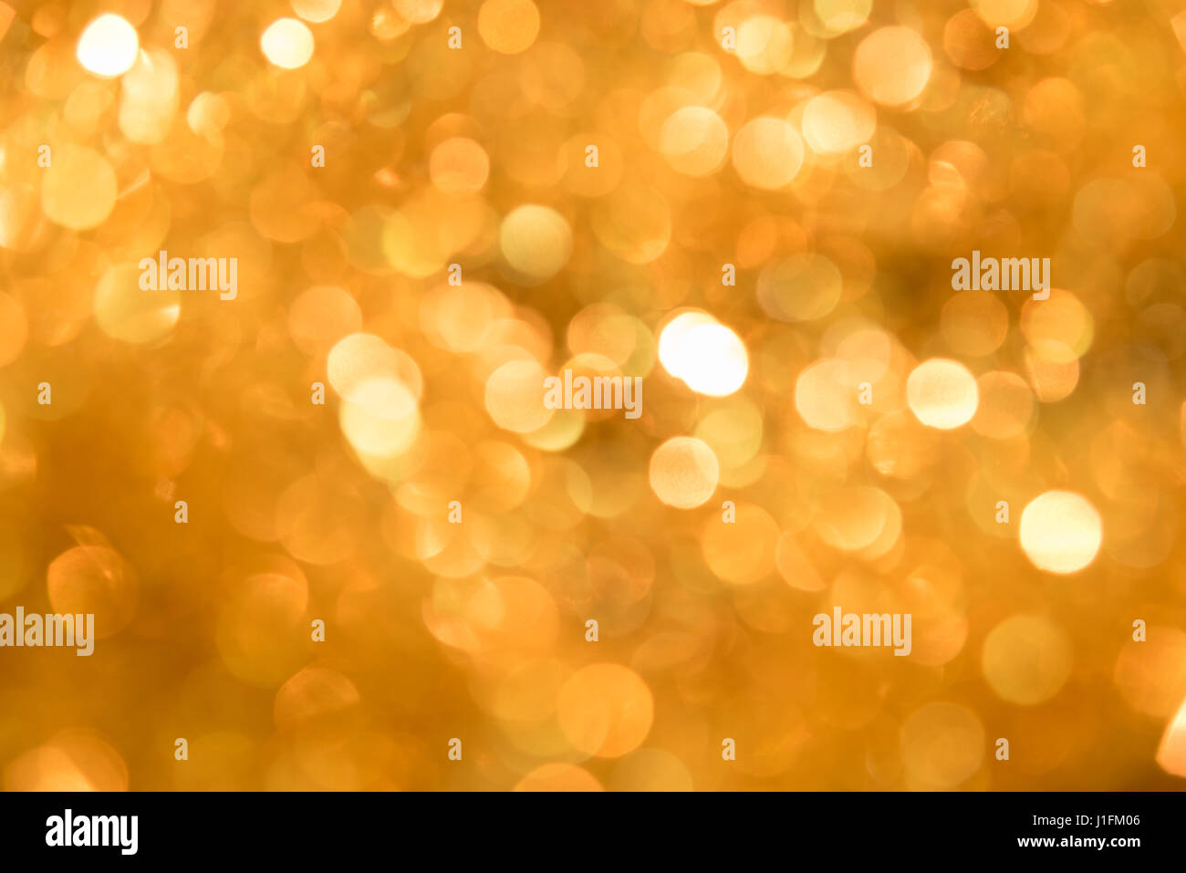 Abstract golden bokeh background Stock Photo - Alamy