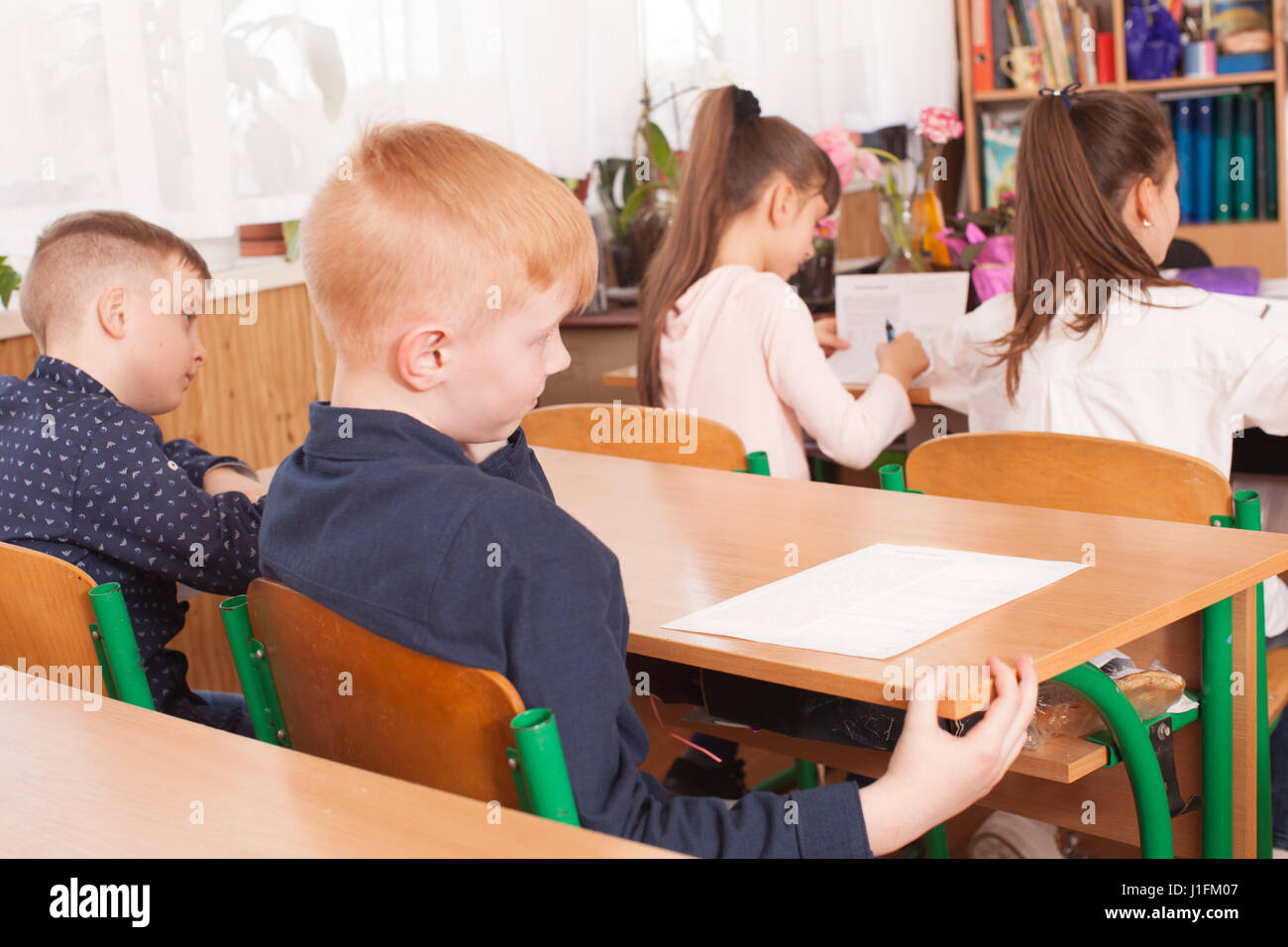 School kid taking test hi-res stock photography and images - Alamy