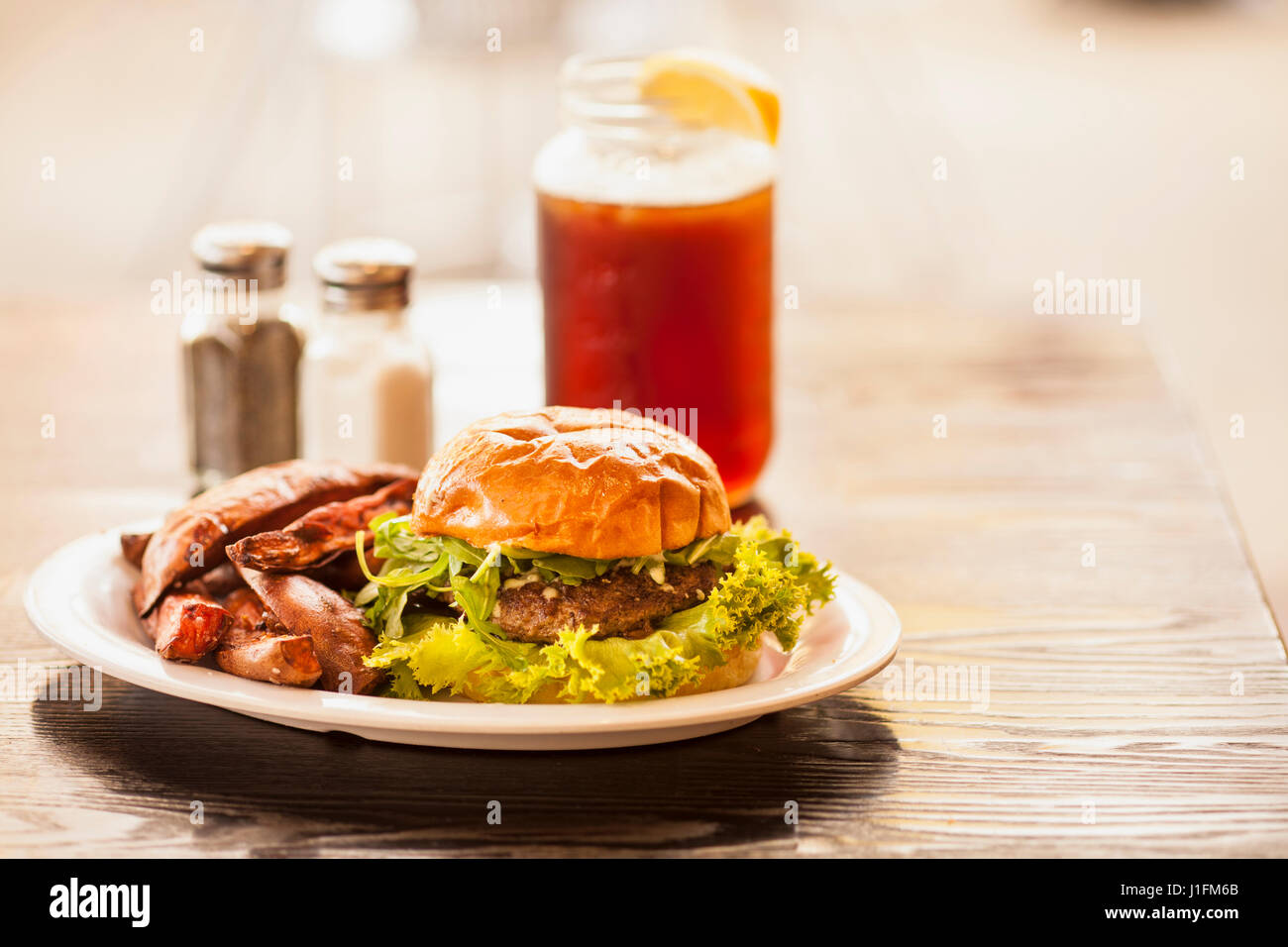 hamburger, fries and ice tea Stock Photo - Alamy