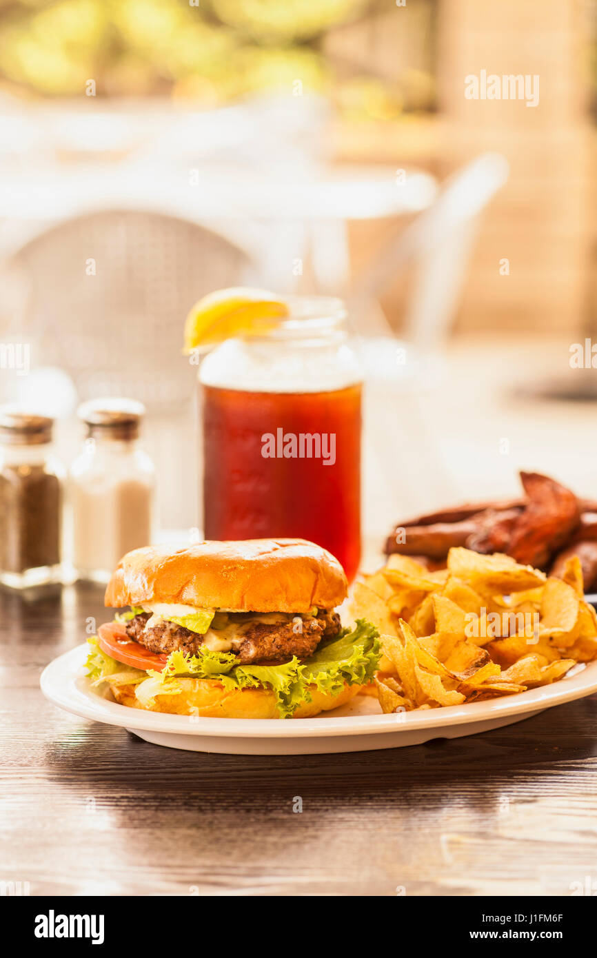 hamburger, fries and ice tea Stock Photo - Alamy
