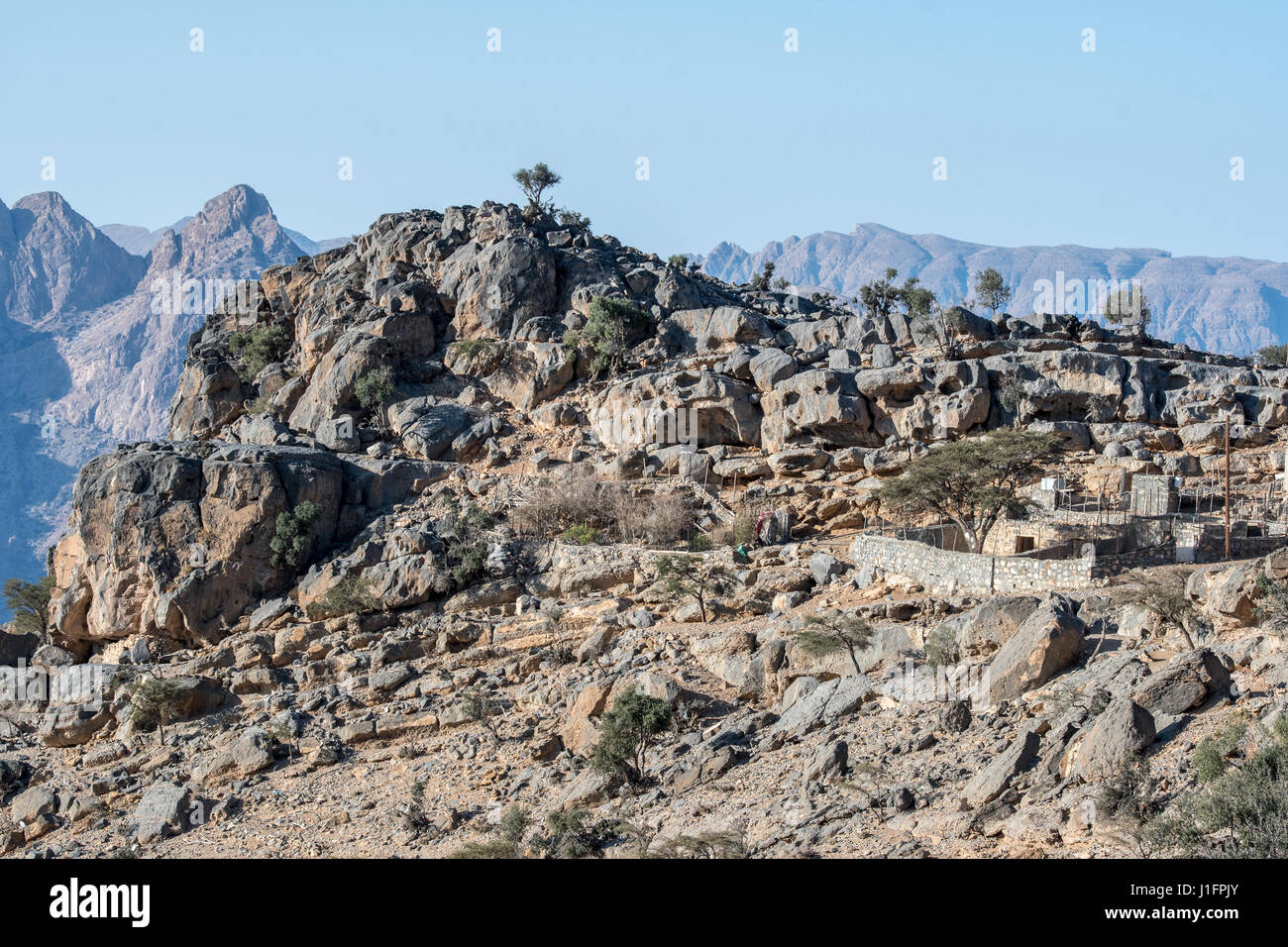Oman; small village along the rocky mountains of Al Hajar at Jebel ...