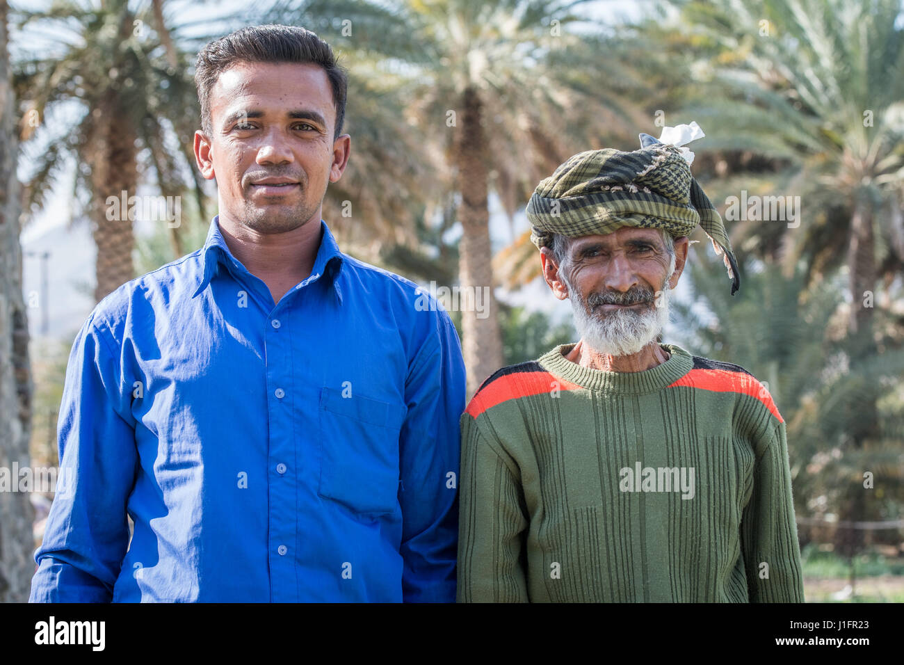 Oman; Wadi Ghul, Two Arabic man on farm Stock Photo - Alamy