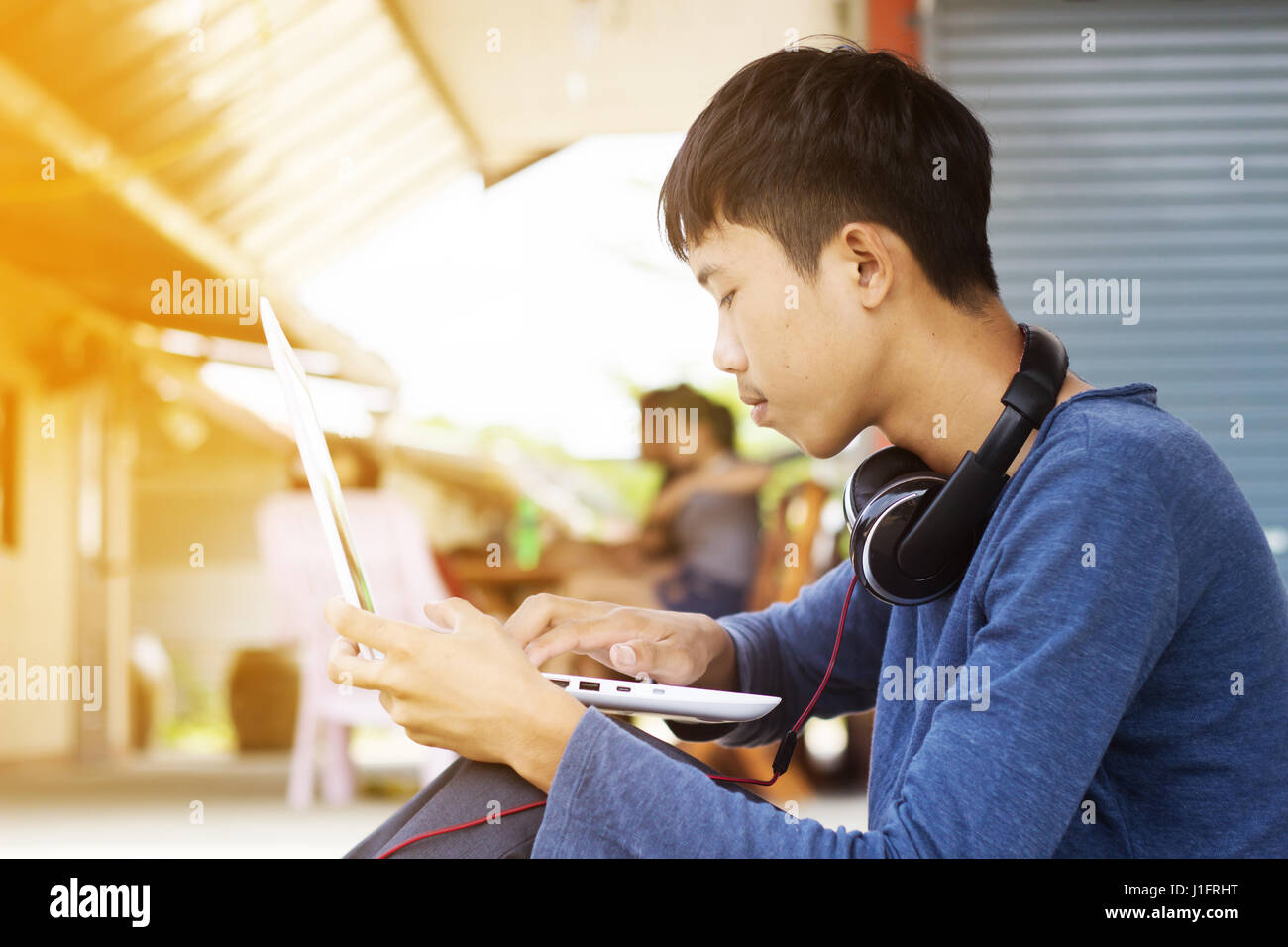 Asian teenager boy computer hi-res stock photography and images - Alamy