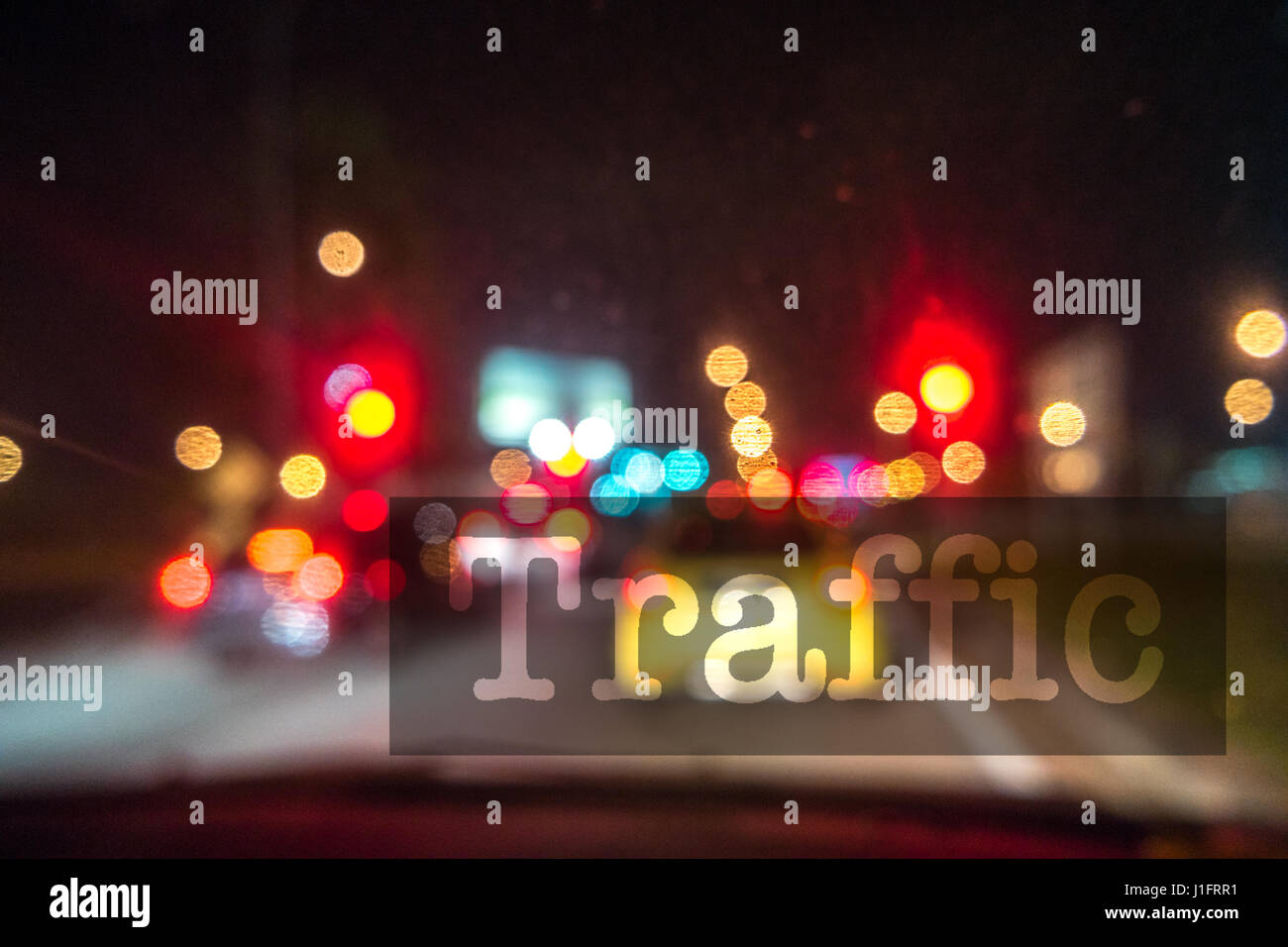 Traffic text with blurred background Stock Photo - Alamy