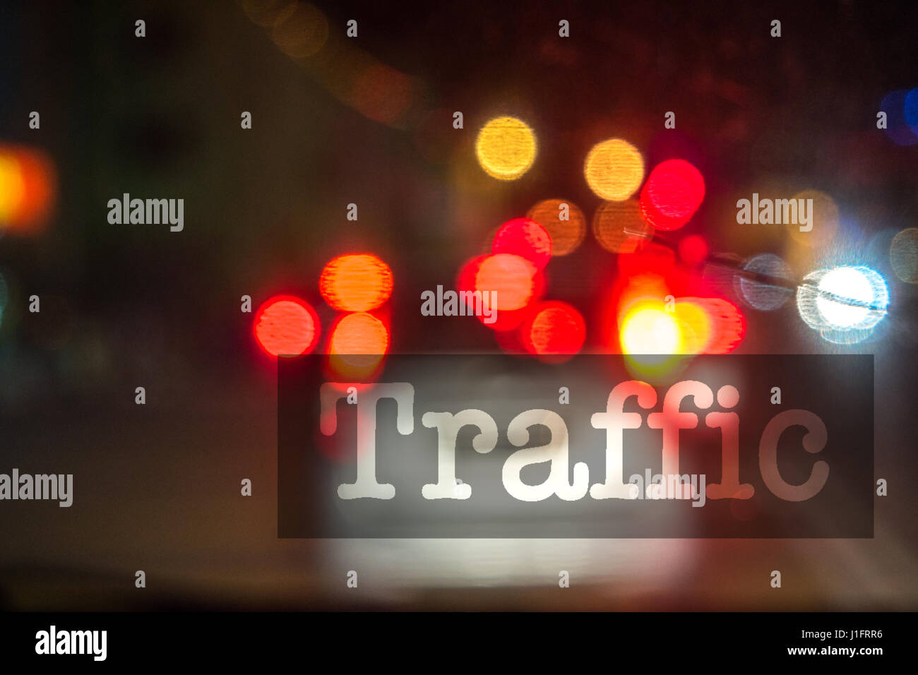 Traffic text with blurred background Stock Photo - Alamy