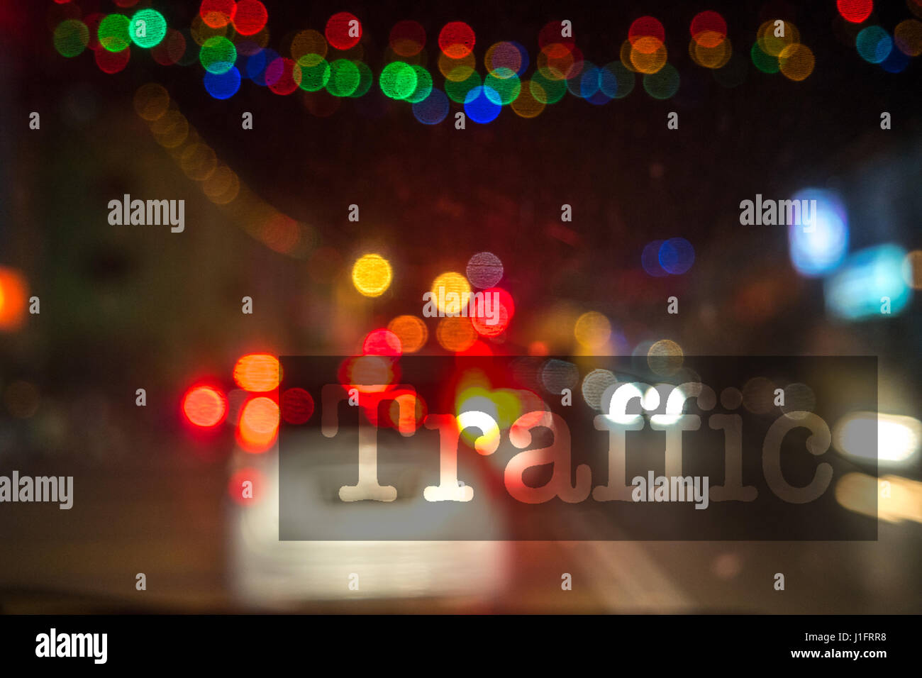 Traffic text with blurred background Stock Photo - Alamy